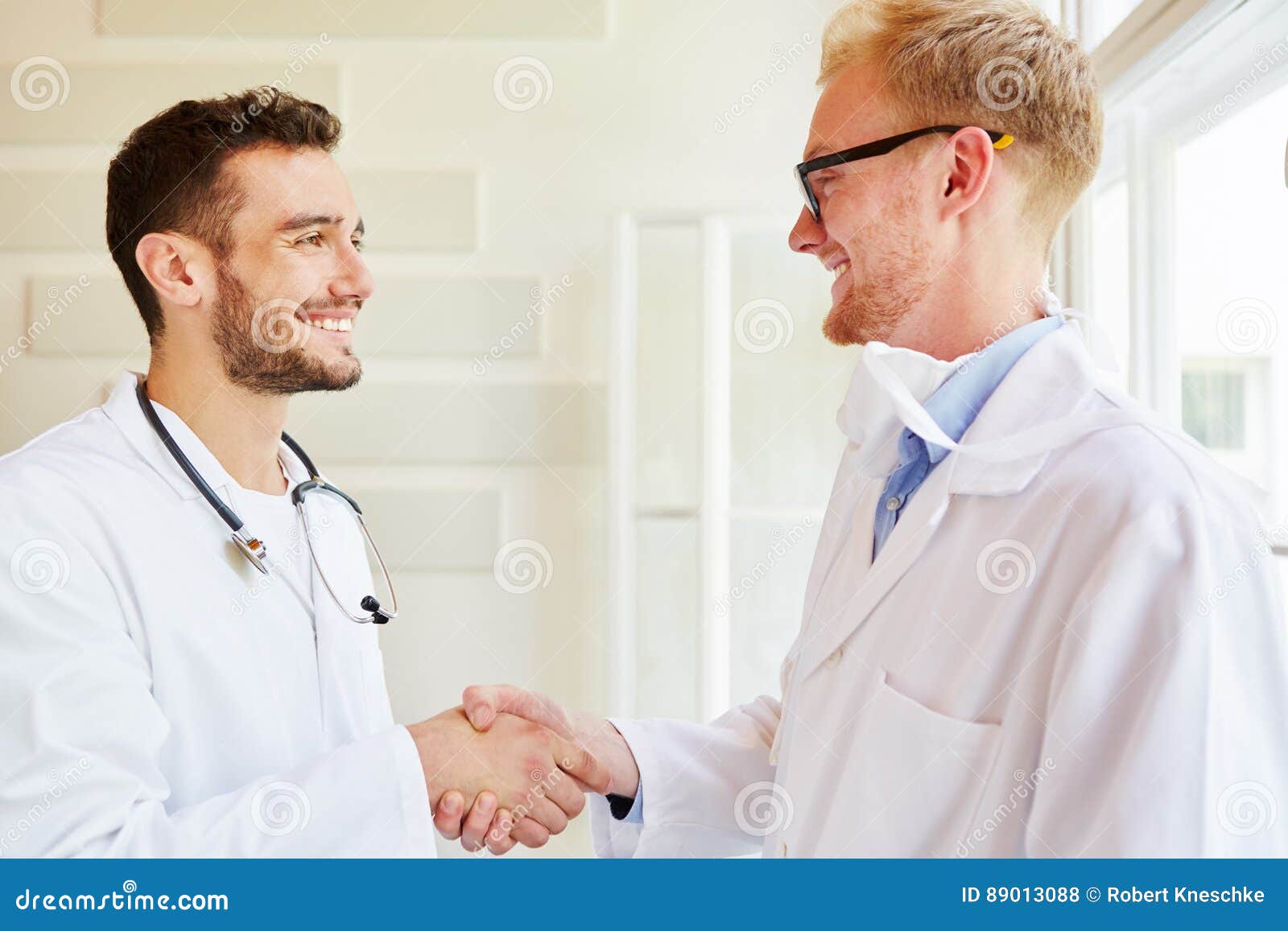 Handshake between Two Doctors Stock Photo - Image of team, successful ...