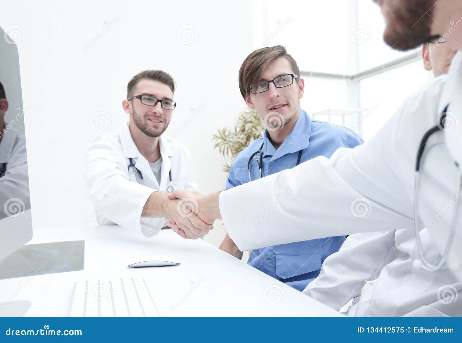 Handshake between the Two Doctors during the Working Meeting Stock ...