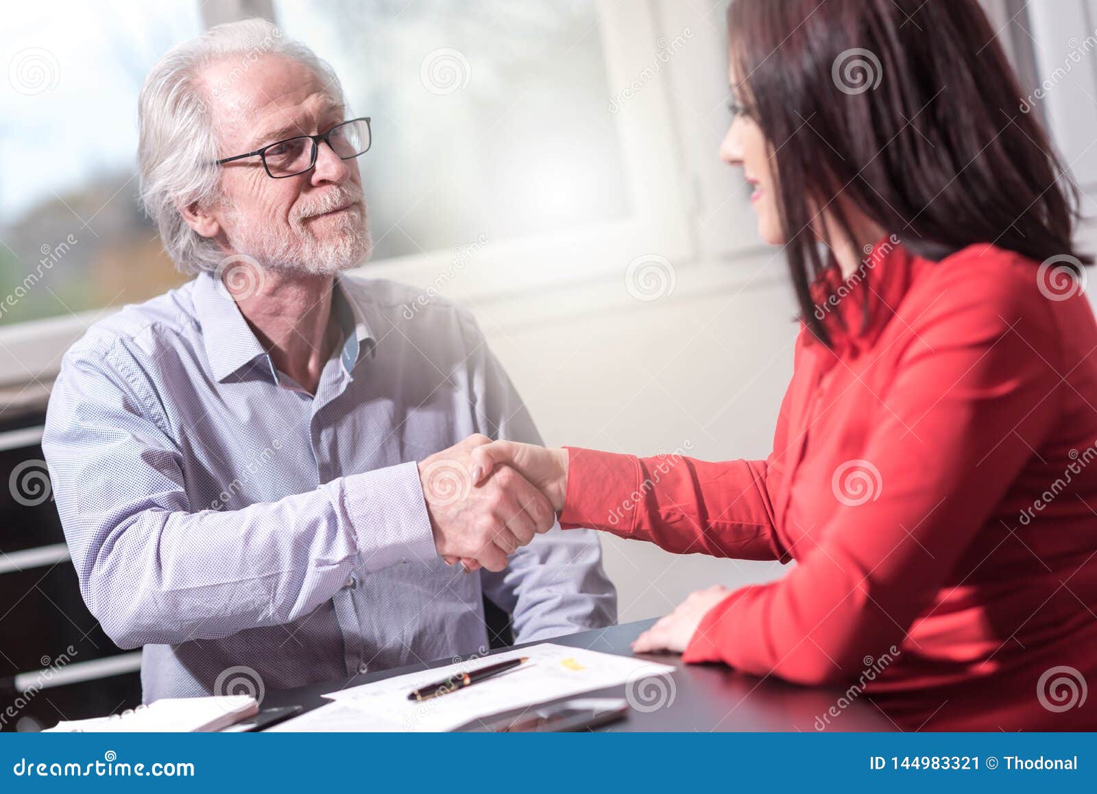 Handshake between Woman and Man at Office, Light Effect Stock Image ...