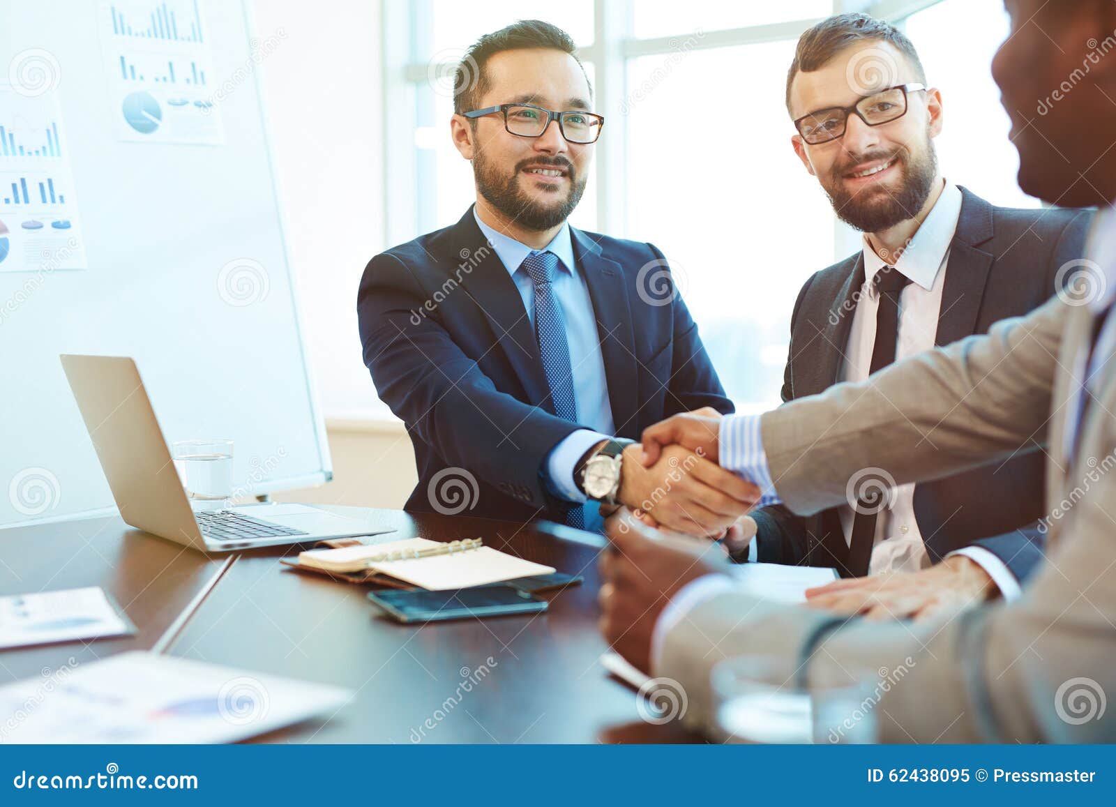 Handshaking with partner stock image. Image of employee - 62438095