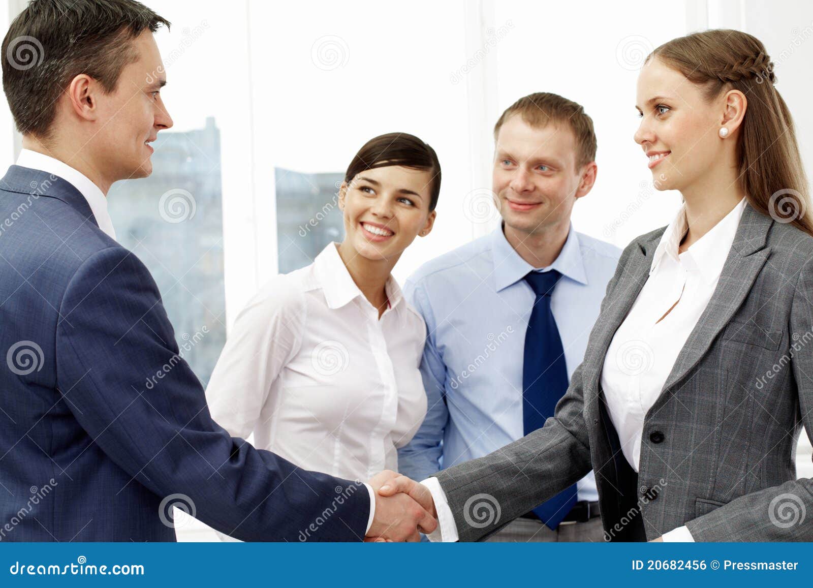 Handshaking partners stock photo. Image of handshaking - 20682456