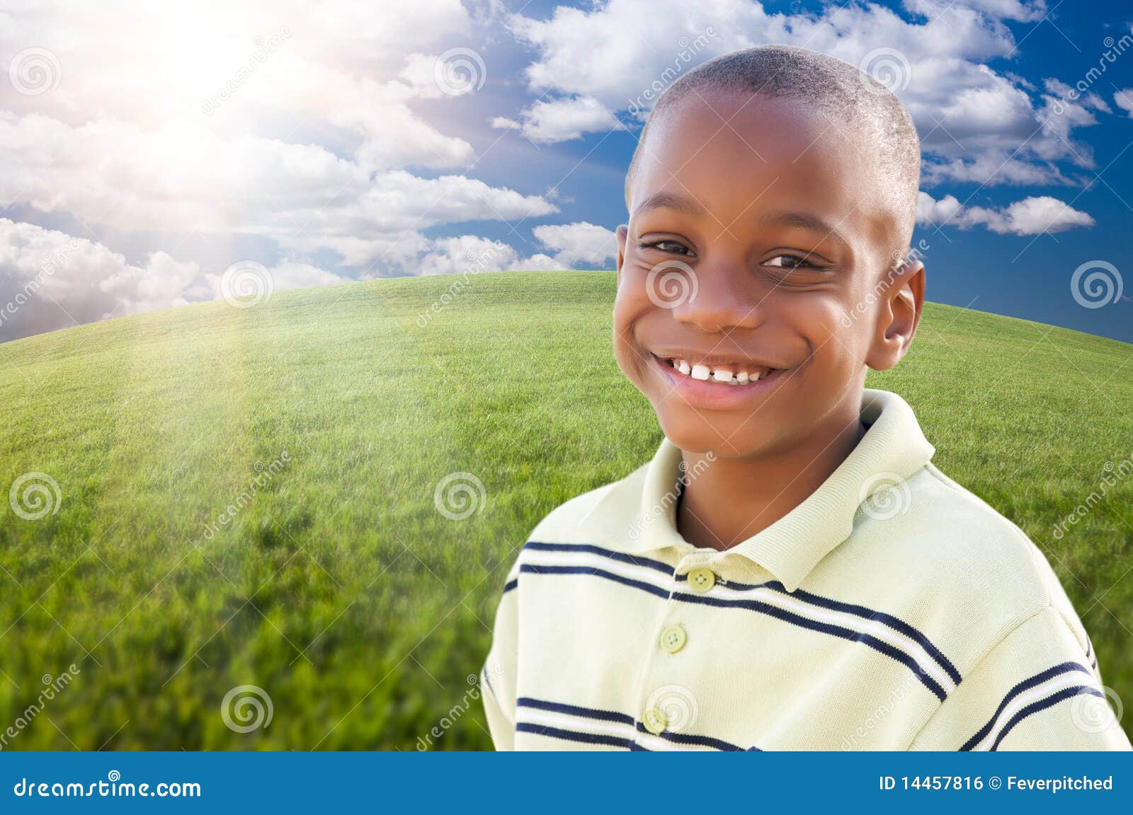Handsome African American Boy Over Grass and Sky Stock Photo - Image of ...