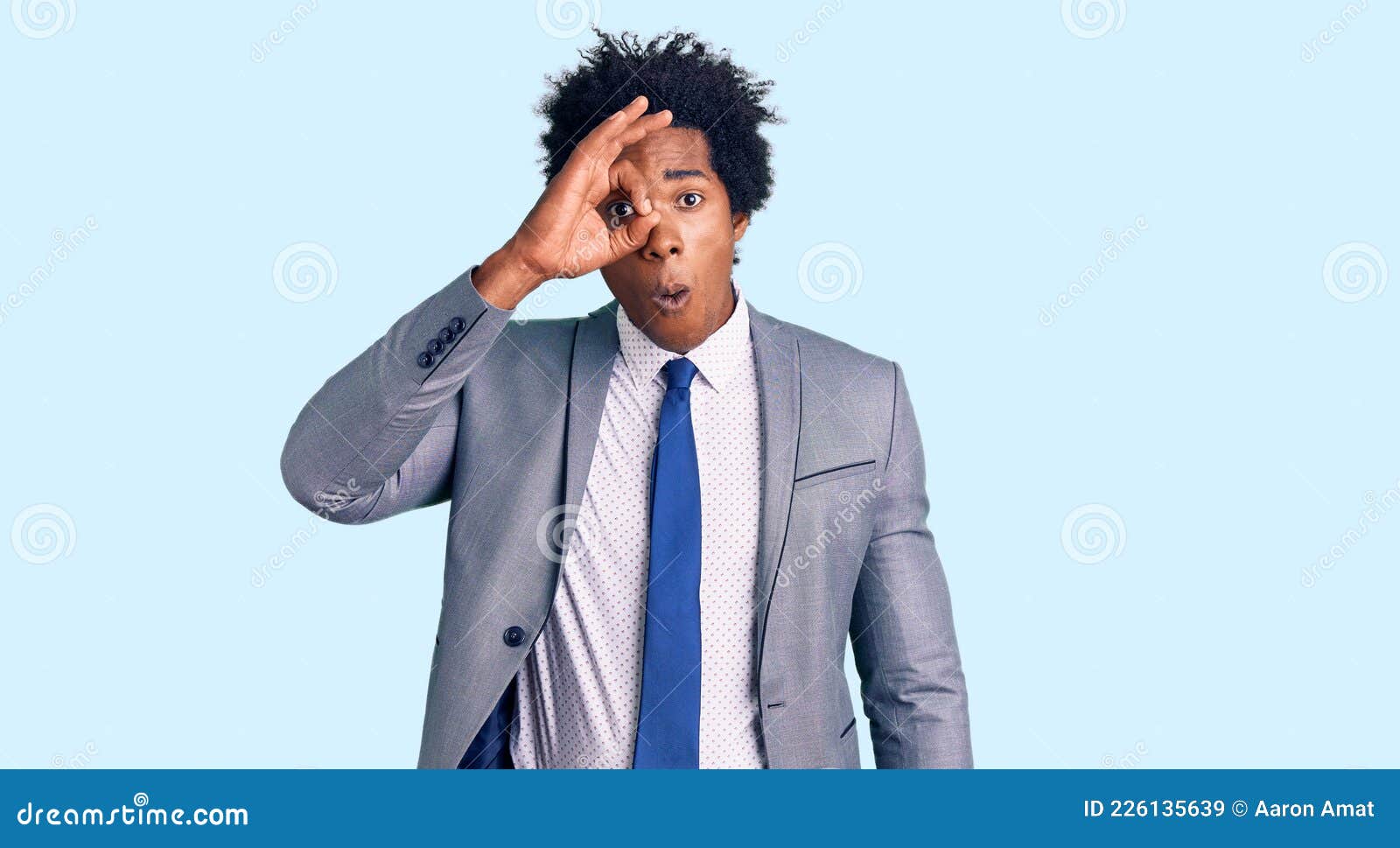 Handsome African American Man With Afro Hair Wearing Business Jacket