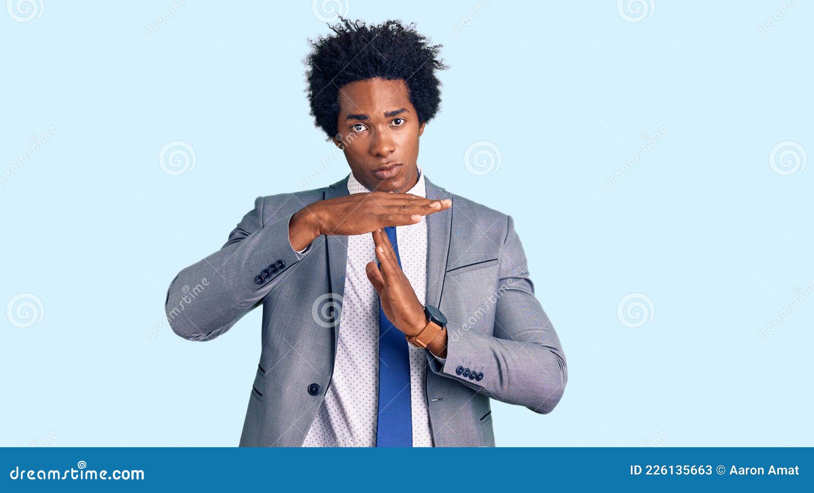 Handsome African American Man With Afro Hair Wearing Business Jacket