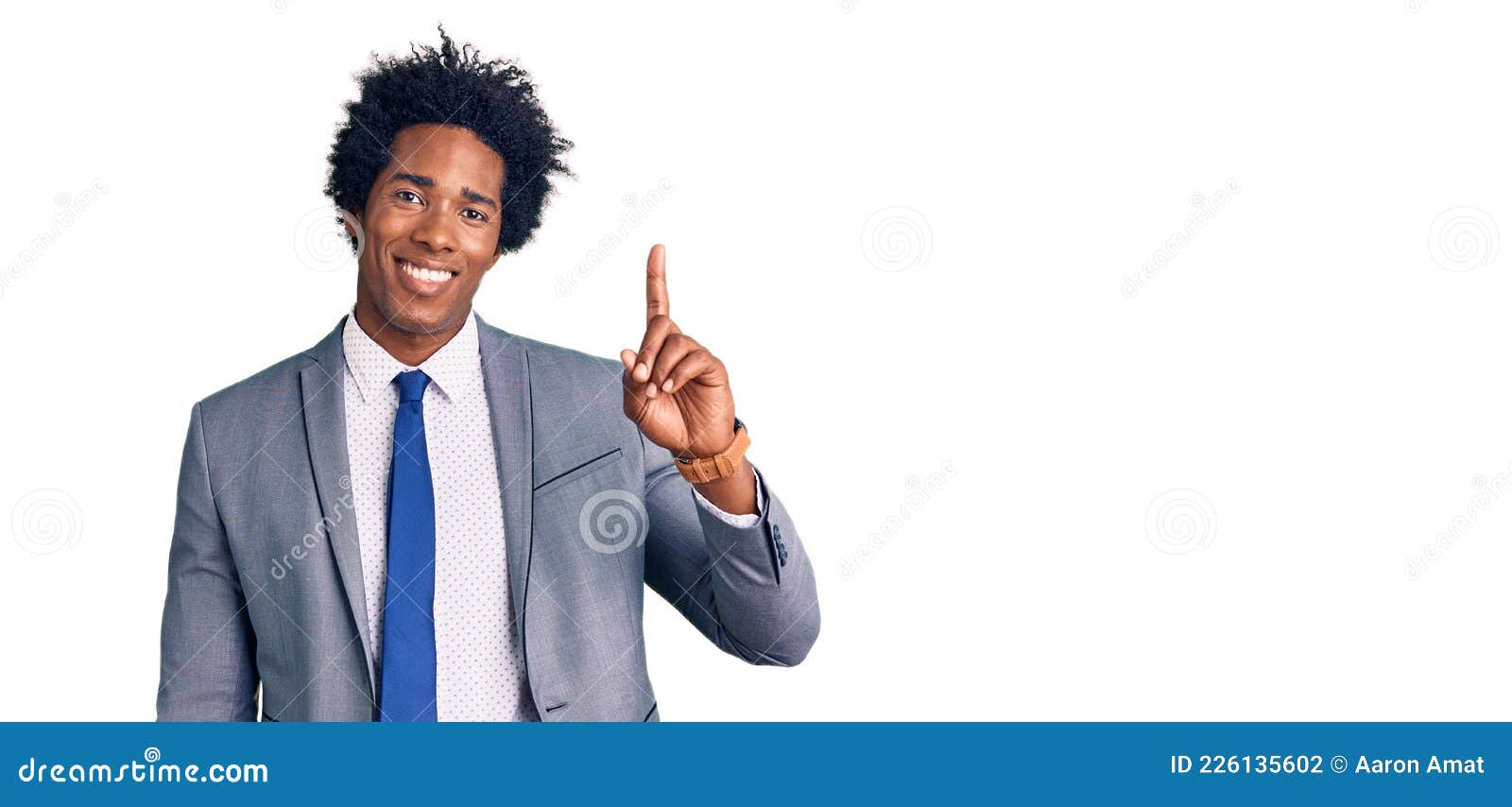 Handsome African American Man With Afro Hair Wearing Business Jacket