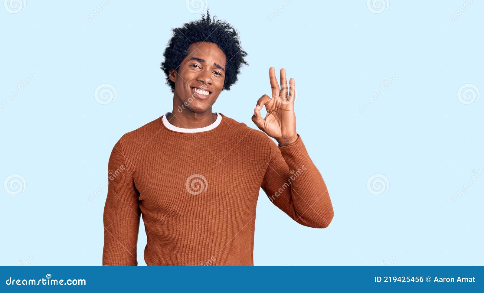 Handsome African American Man With Afro Hair Wearing Casual Clothes