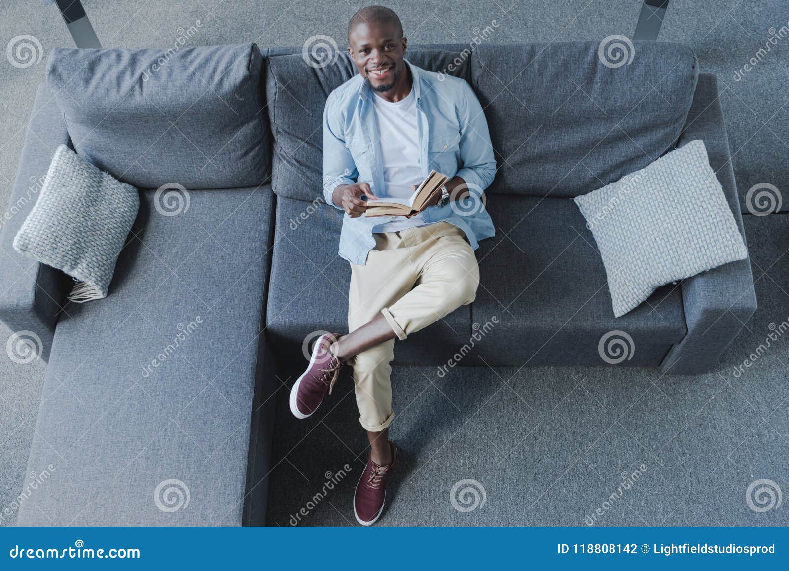 Handsome African American Man Reading Book Stock Photo - Image of ...