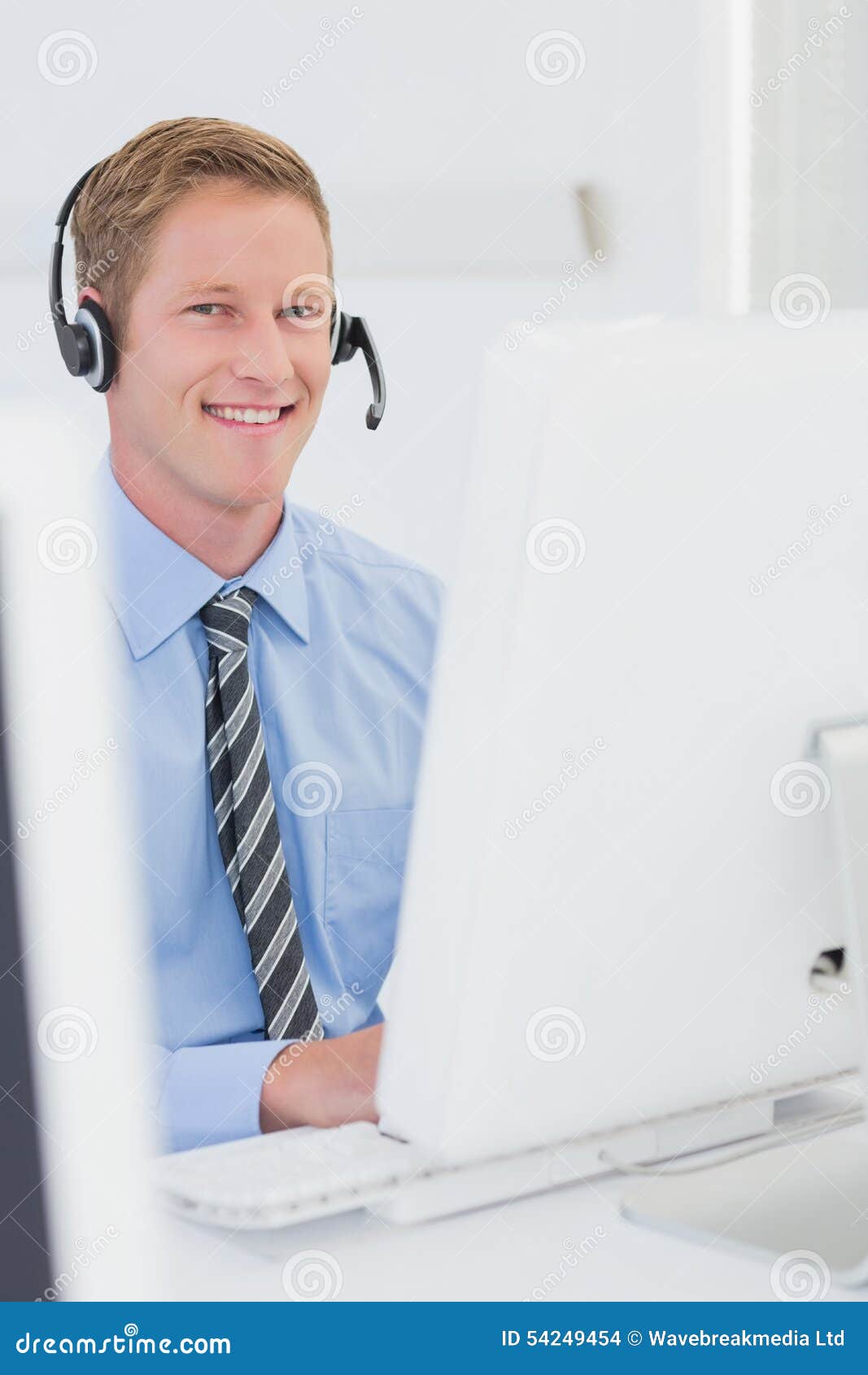 Handsome Agent with Headset Typing on Keyboard Stock Photo - Image of ...