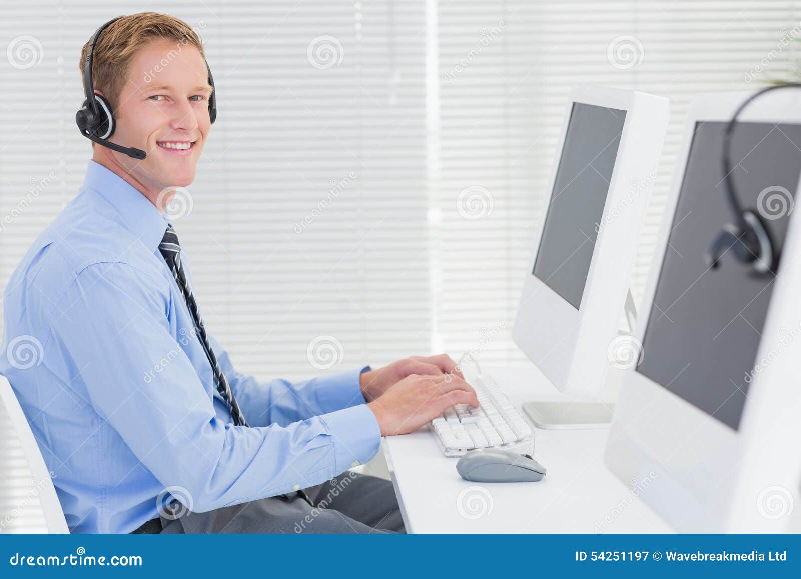 Handsome Agent with Headset Typing on Keyboard Stock Image - Image of ...