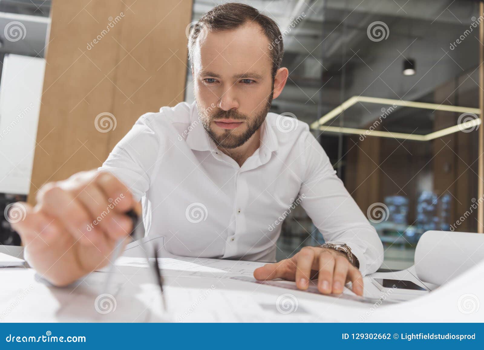 Handsome Architect with Compass Drawing Building Plans Stock Photo ...