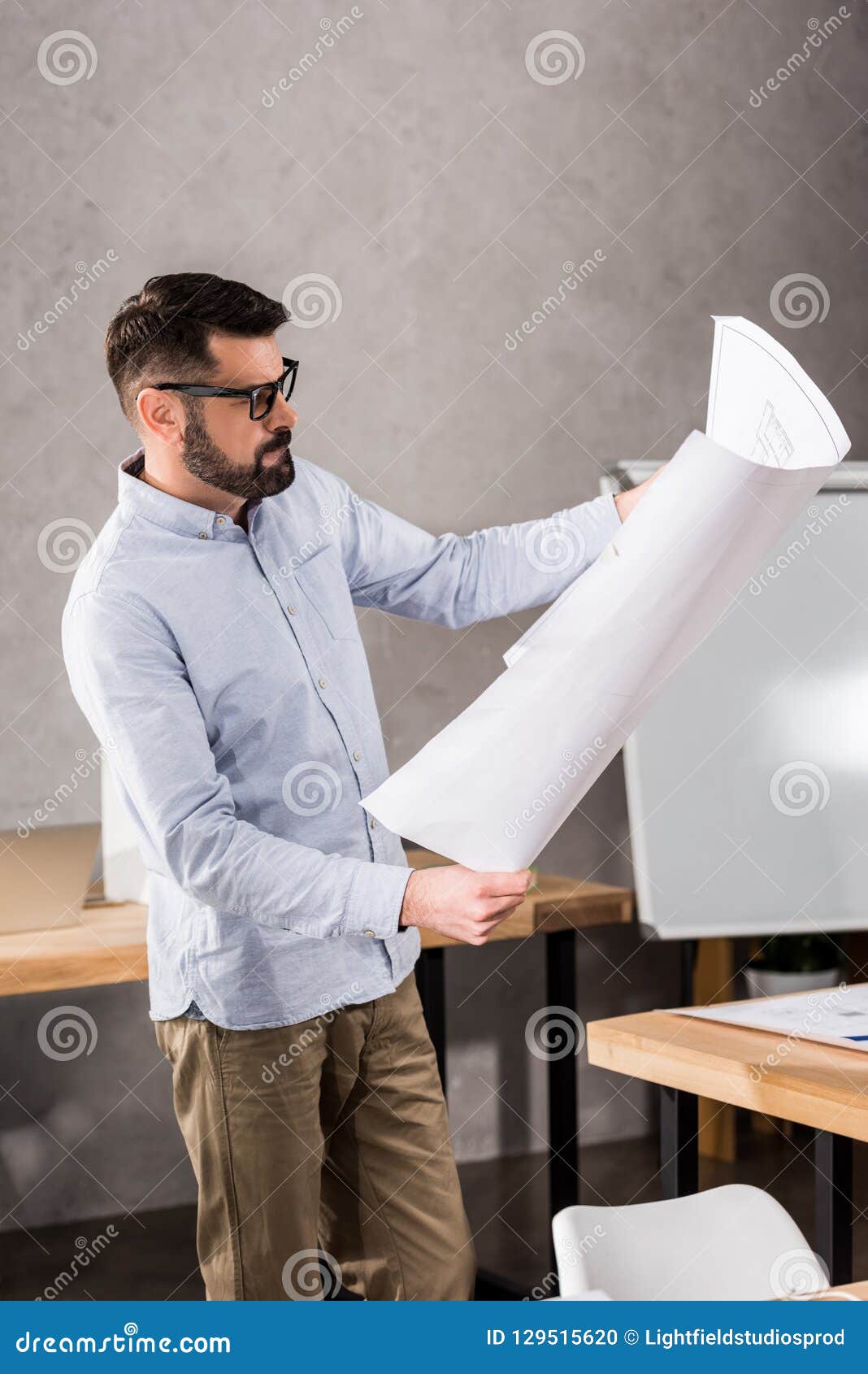 Handsome Architect Looking at Blueprint Stock Photo - Image of ...
