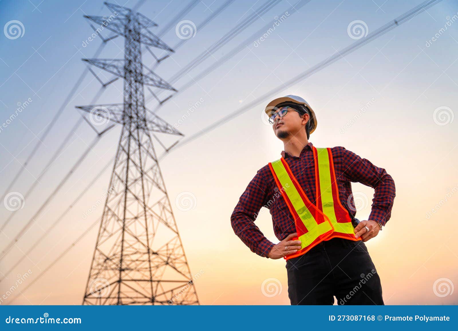 Handsome Asian Electrical Engineer Standing at High Voltage Pylon ...