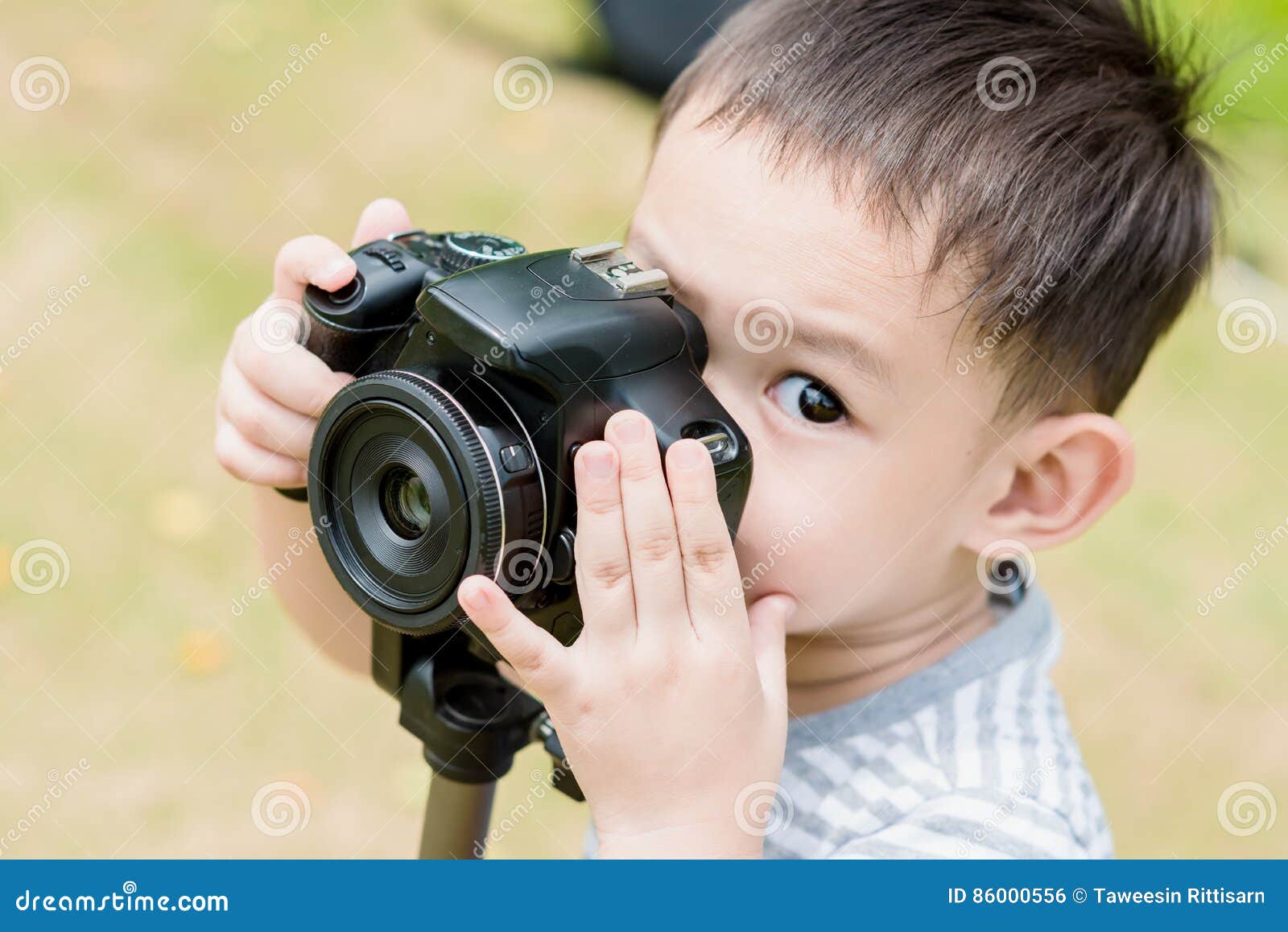 A Handsome Asian Kid Take a Photo by DSLR Camera Stock Photo - Image of ...