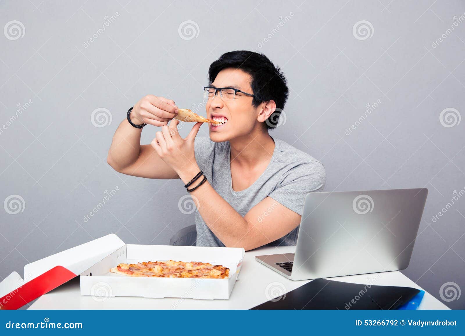 Handsome Asian Man Eating Pizza Stock Photo - Image of glasses, open ...