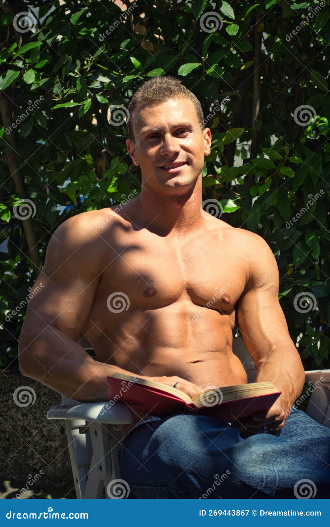 Handsome Athletic Young Man Reading Book Outside Stock Image - Image of ...