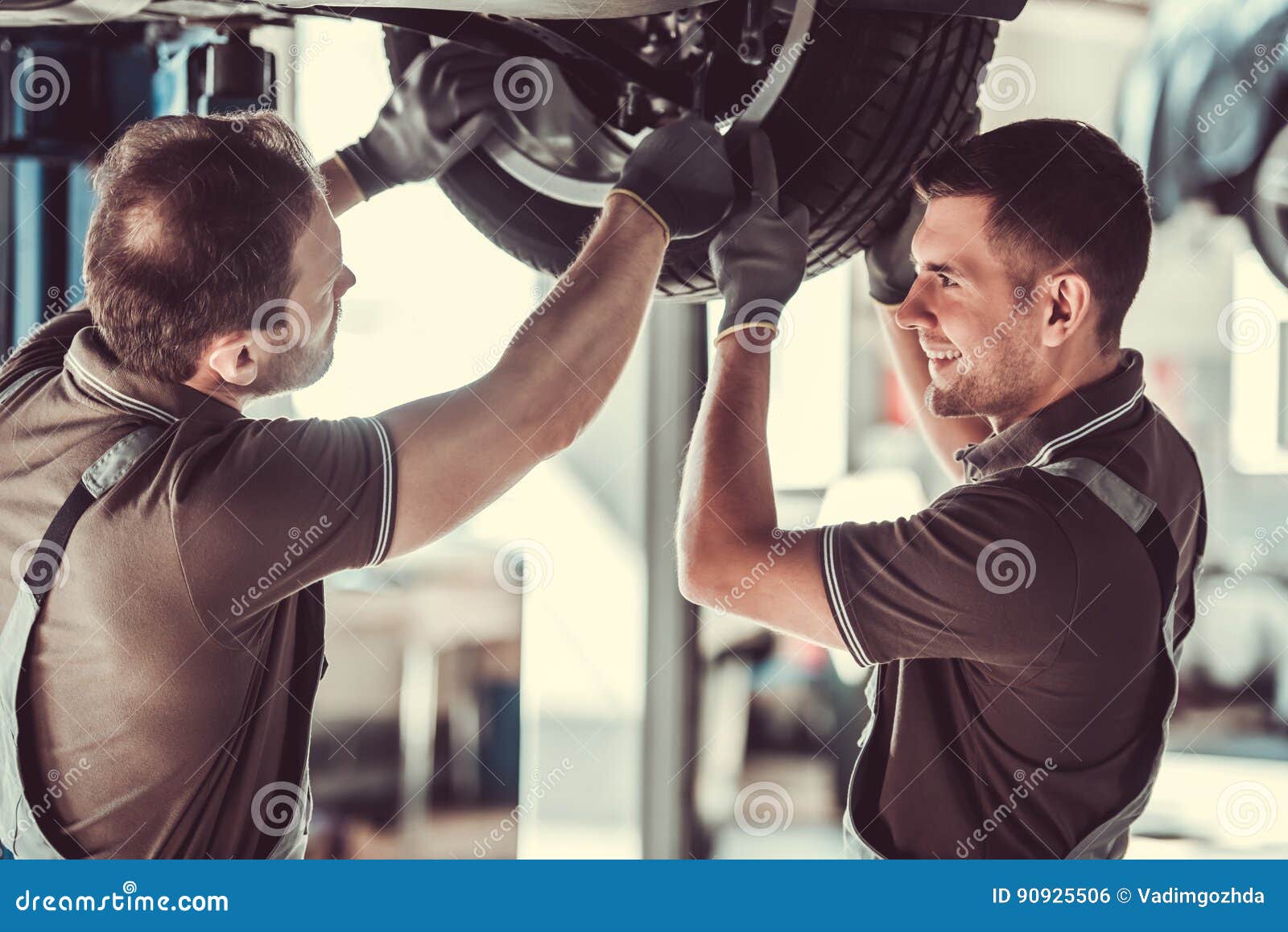 Handsome Auto Service Workers Stock Photo - Image of mechanic, station ...
