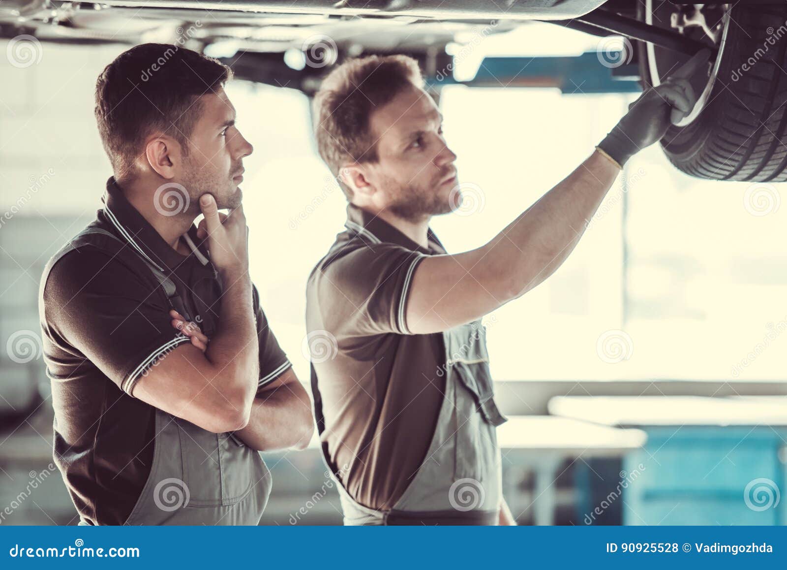 Handsome Auto Service Workers Stock Photo - Image of safety, shop: 90925528