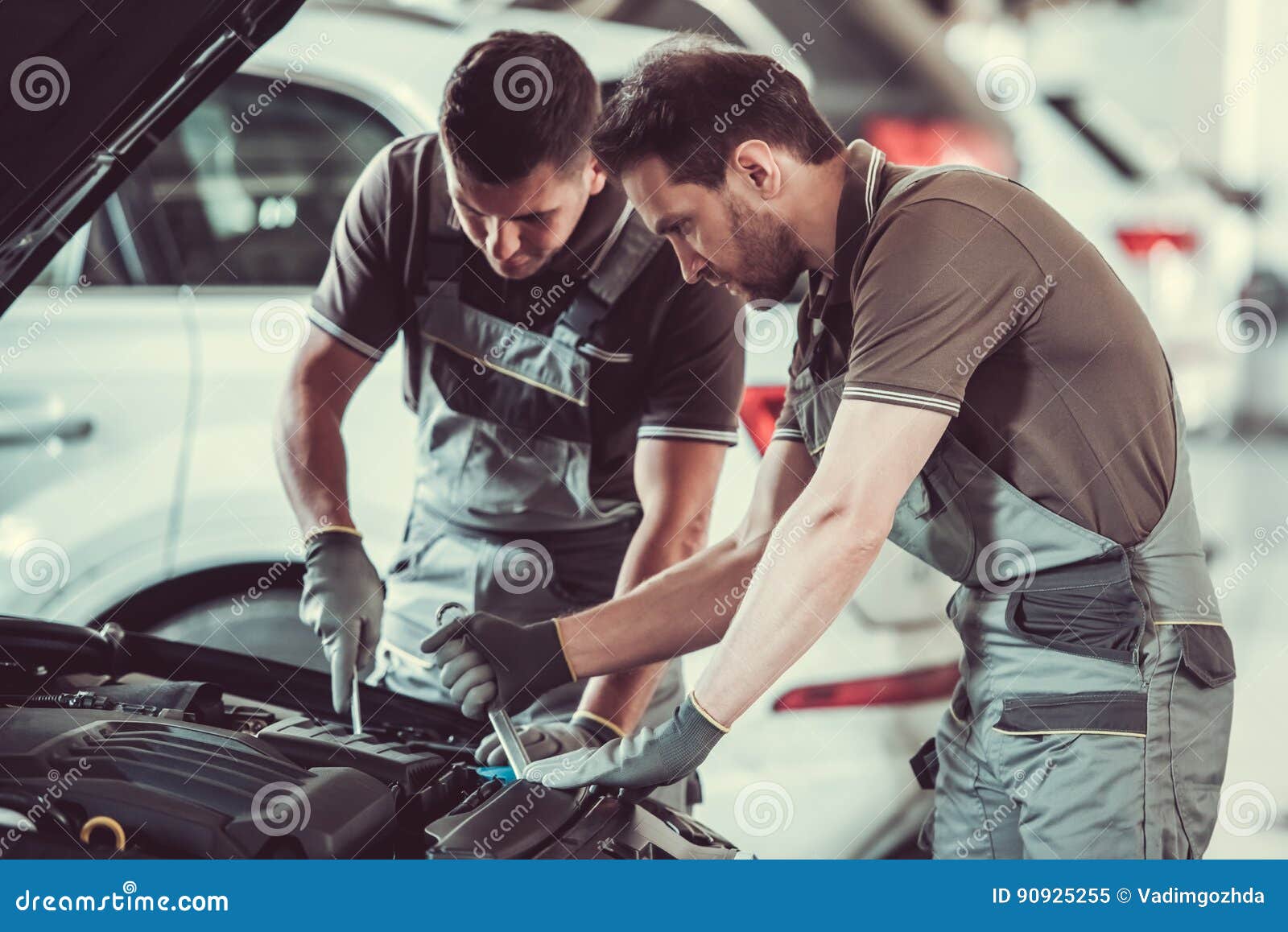 Handsome Auto Service Workers Stock Image - Image of examination ...