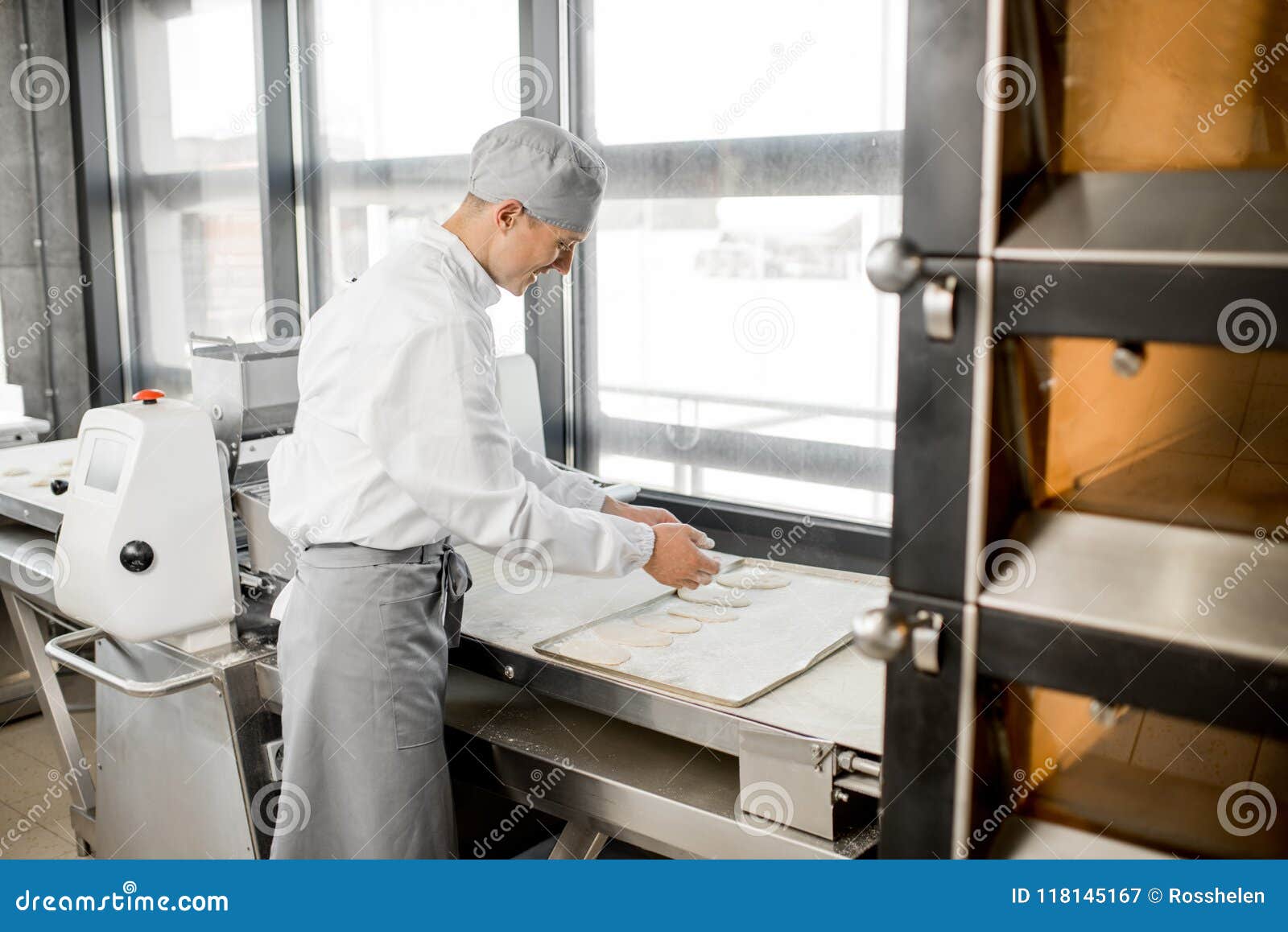 Baker Rolling Dough at the Manufacturing Stock Image - Image of ...