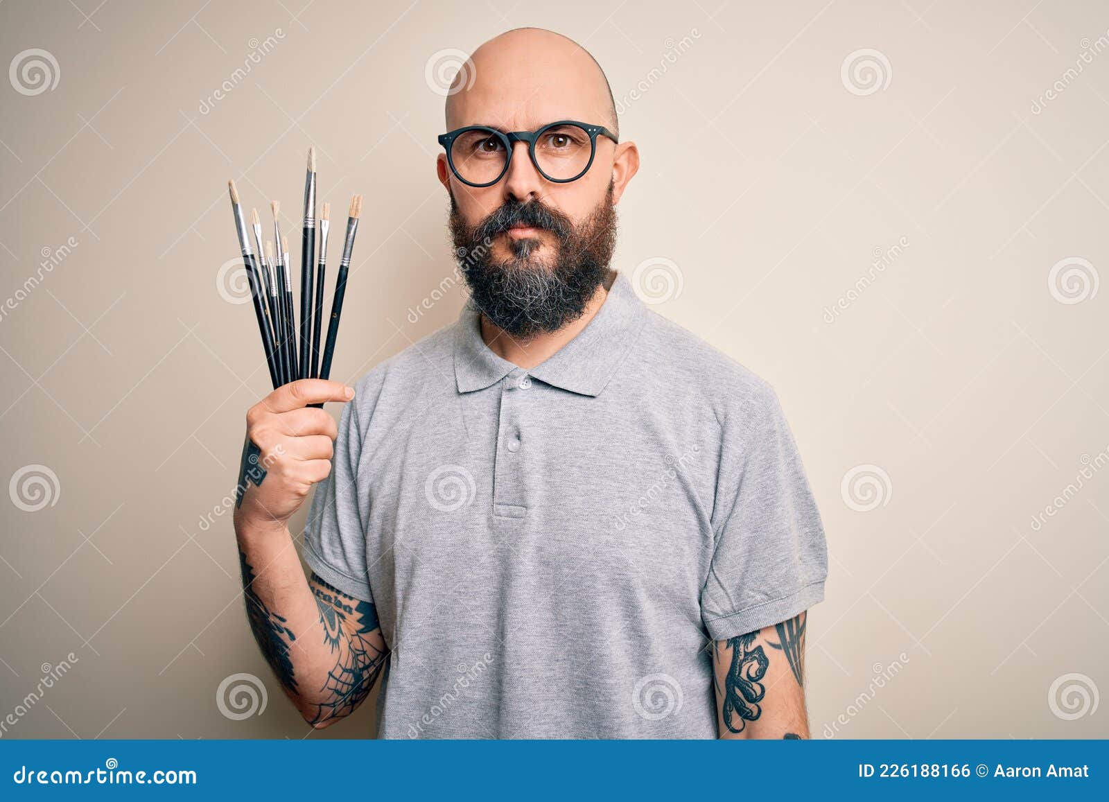 Handsome Bald Artist Man with Beard and Tattoo Painting Using Painter ...