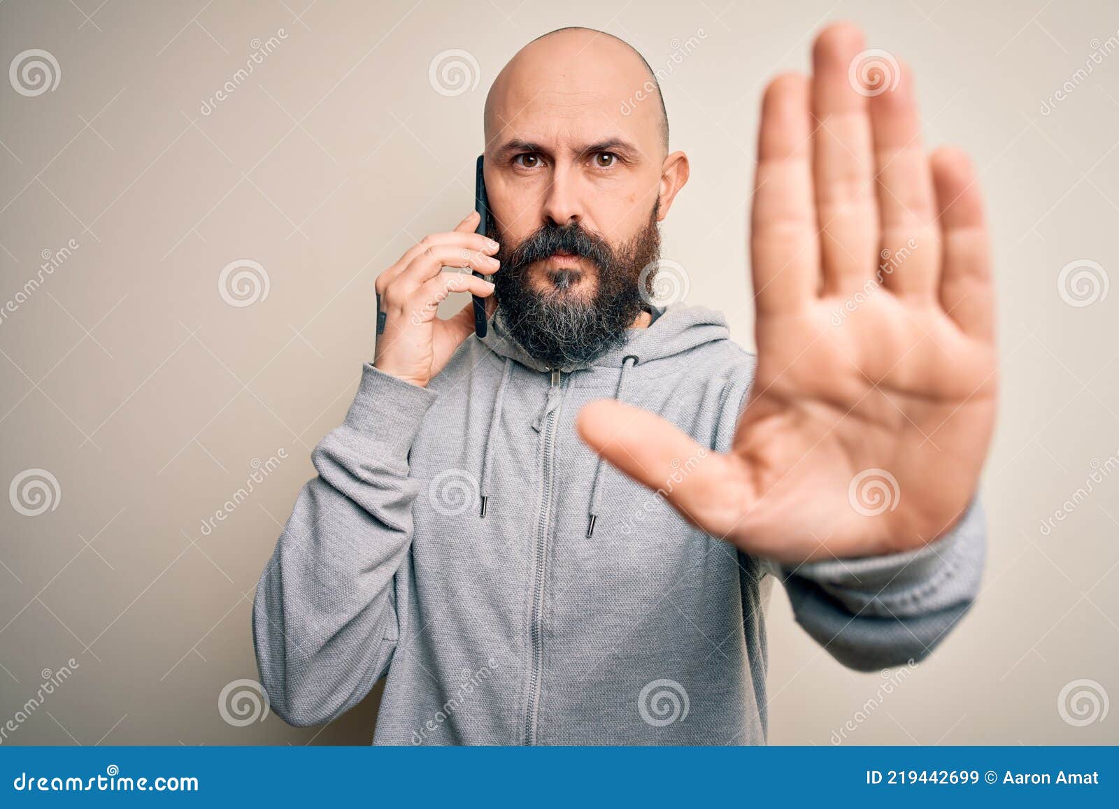 Handsome Bald Man with Beard Having Conversation Talking on the ...