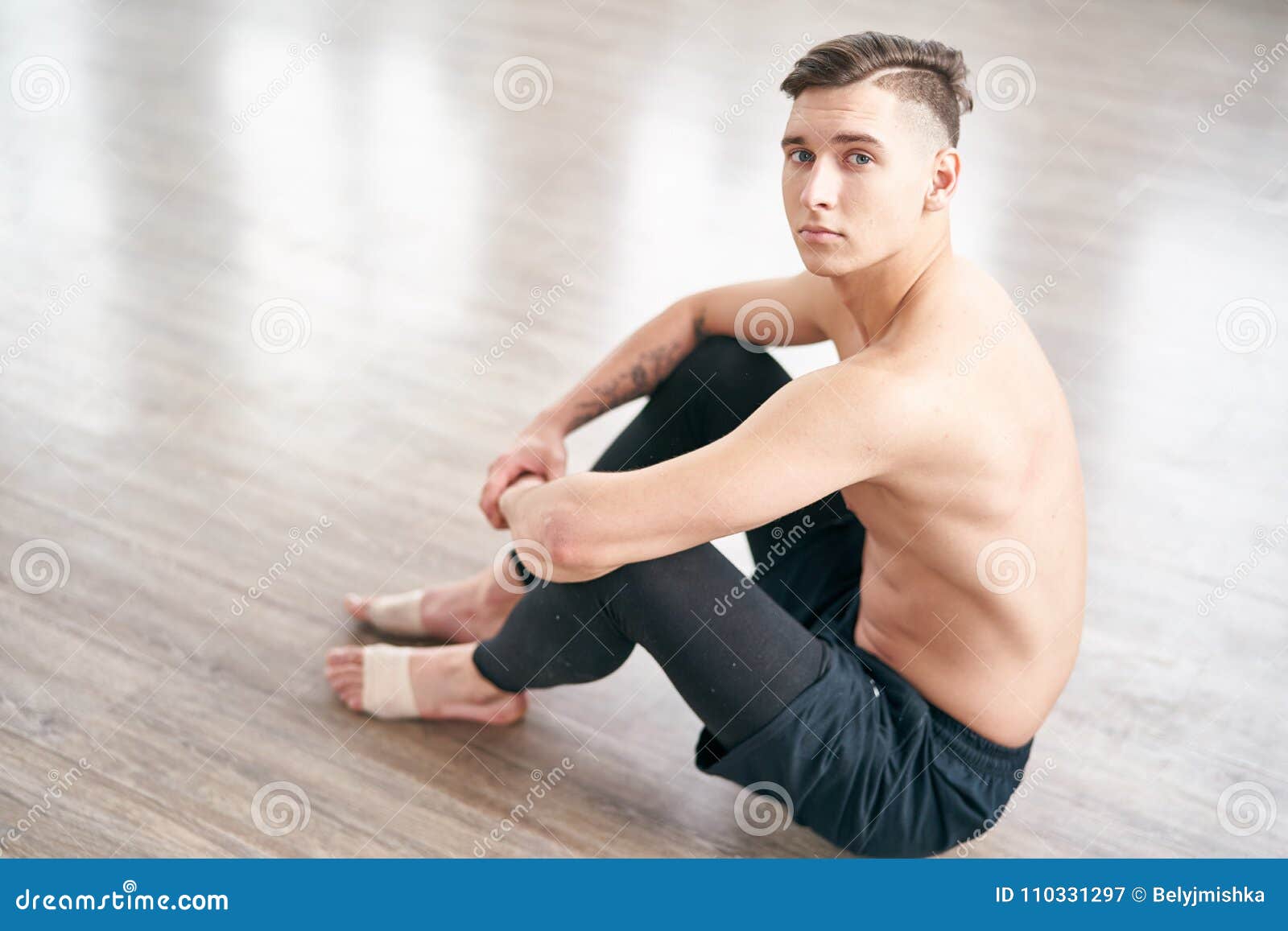 Handsome Ballet Dancer Sitting on the Floor and Resting Stock Image ...