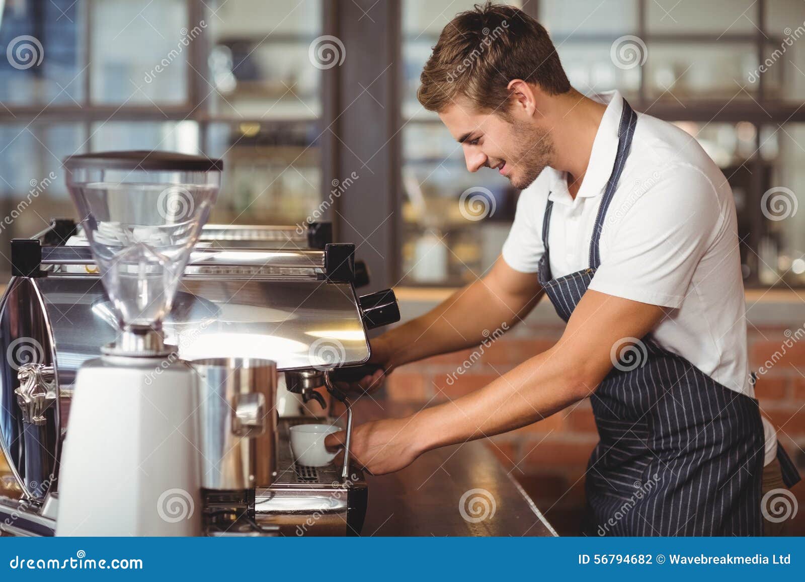 Handsome Barista Making a Cup of Coffee Stock Photo - Image of apron ...
