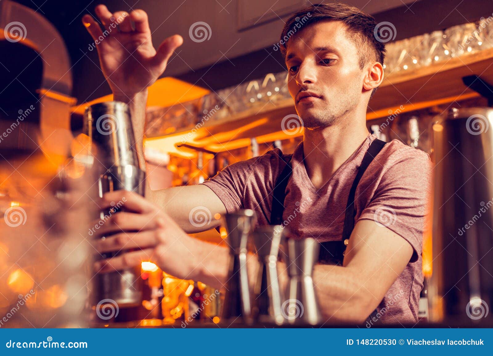 Handsome Barman Feeling Involved while Making Cocktail for Client Stock ...
