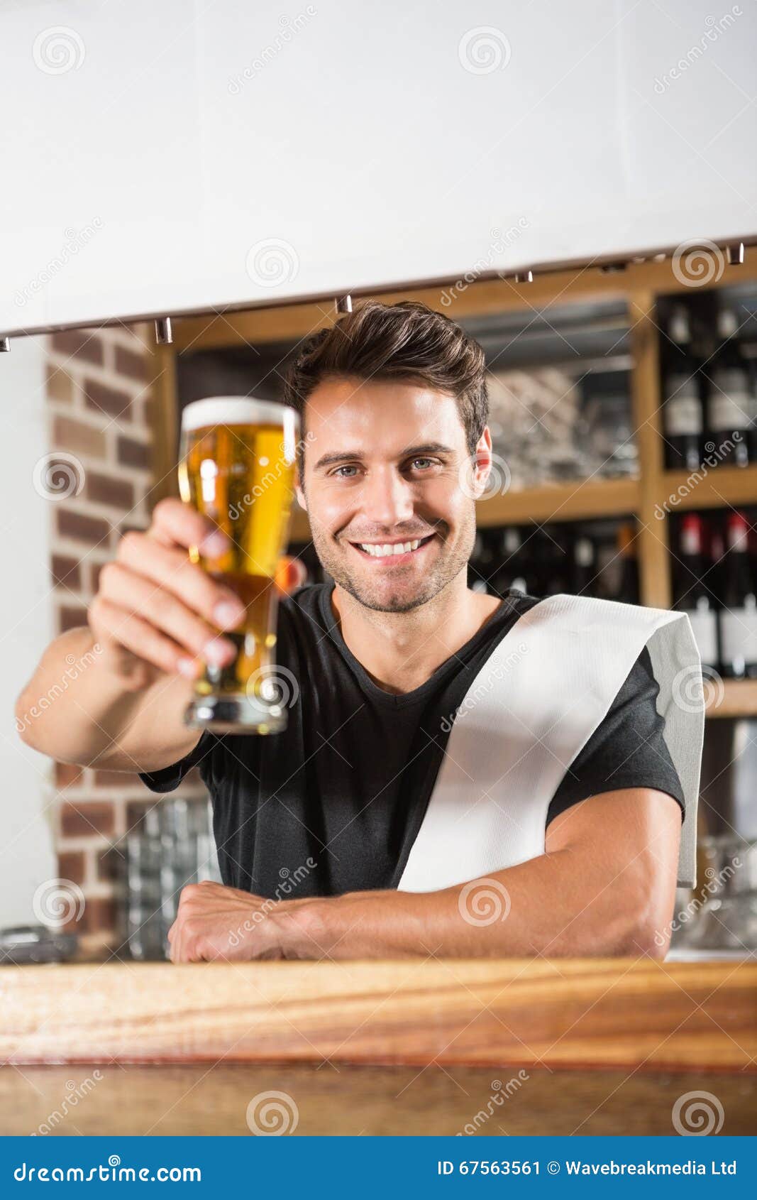 Handsome Barman Holding a Pint of Beer Stock Image - Image of barman ...