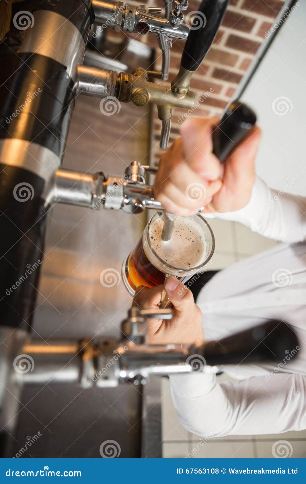 Handsome Barman Pouring a Pint of Beer Stock Photo - Image of caucasian ...
