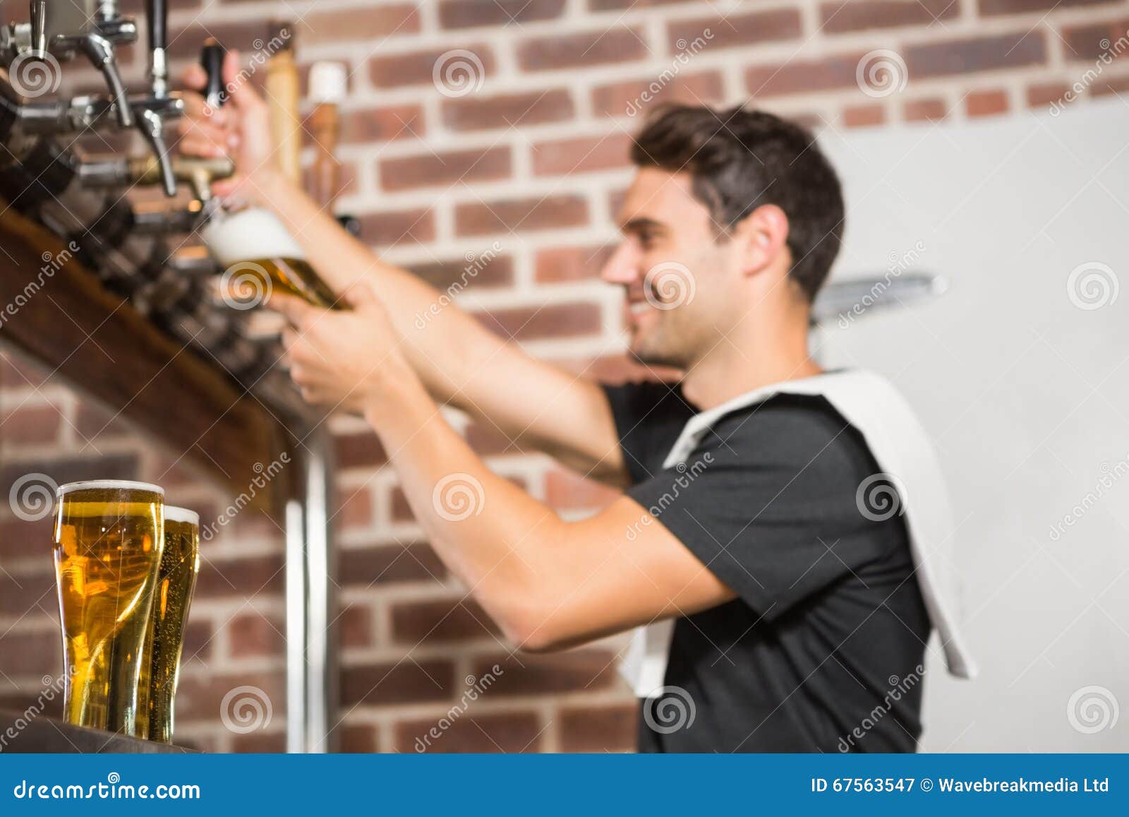 Handsome Barman Pouring a Pint of Beer Stock Image - Image of ...