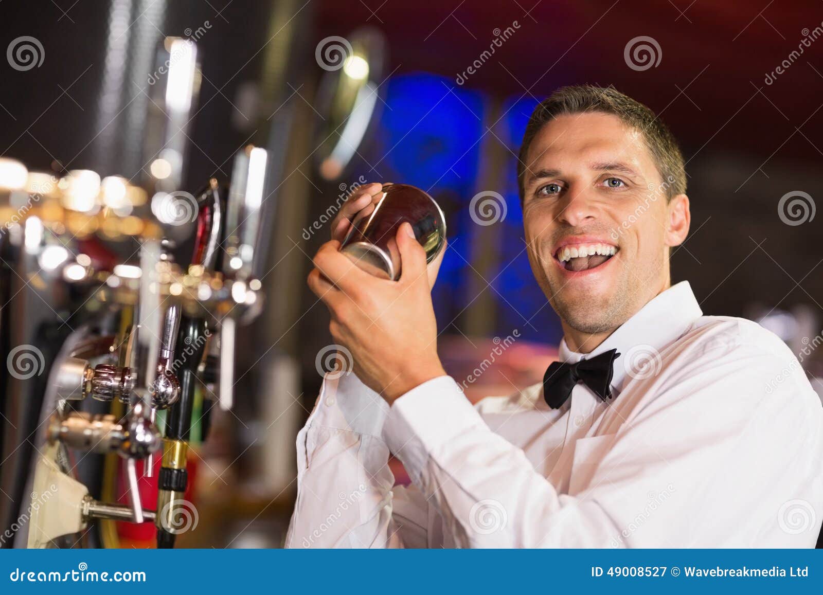 Handsome Barman Smiling at Camera Making a Cocktail Stock Image - Image ...
