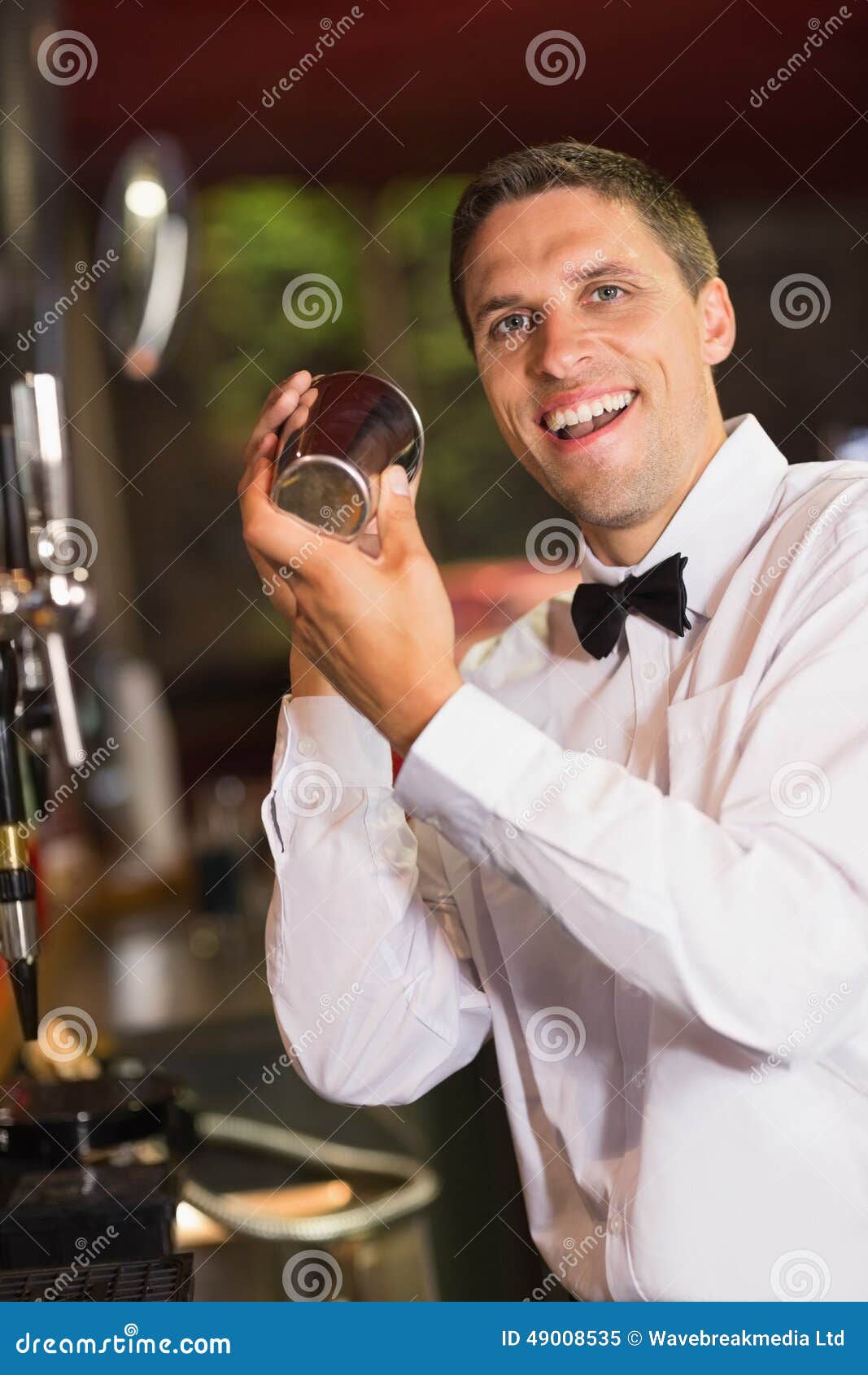 Handsome Barman Smiling at Camera Making a Cocktail Stock Image - Image ...