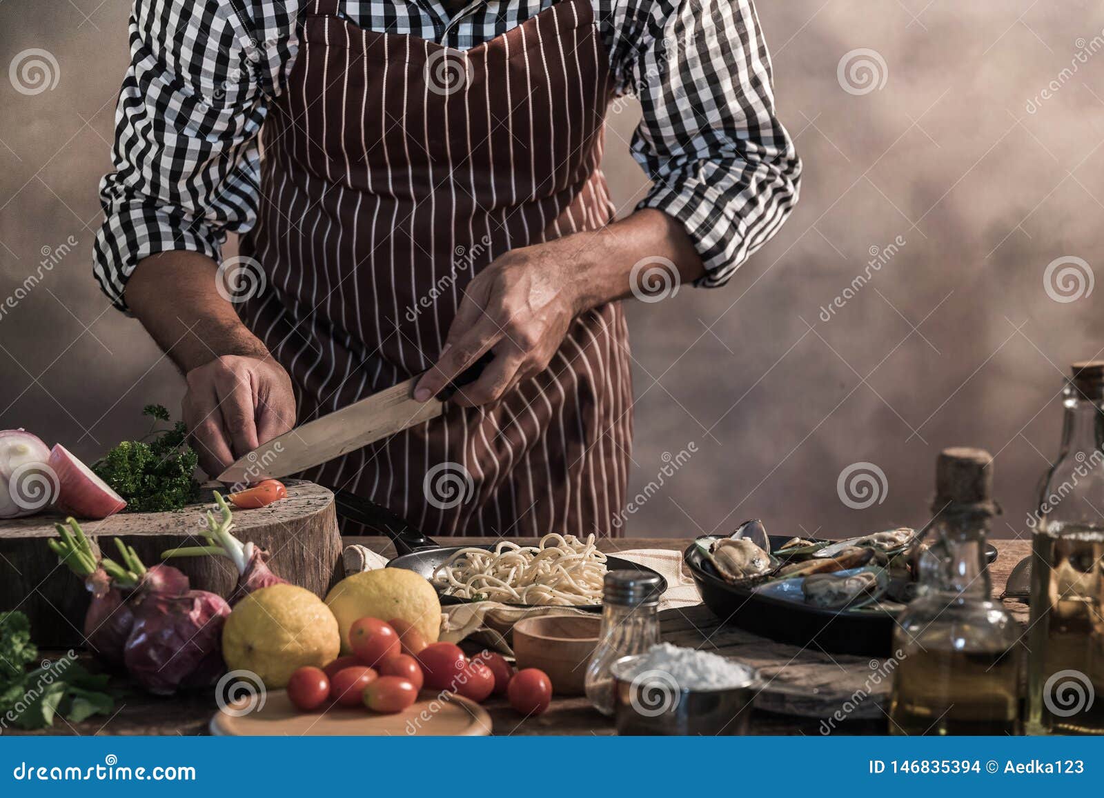 Handsome Bearded Cheef Cook Prepairing Spaghetti on a Kitchen Stock ...