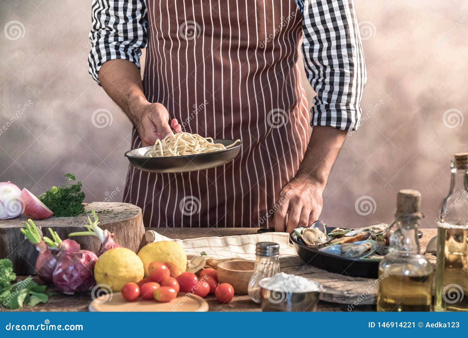 Handsome Bearded Cheef Cook Prepairing Spaghetti on a Kitchen Stock ...