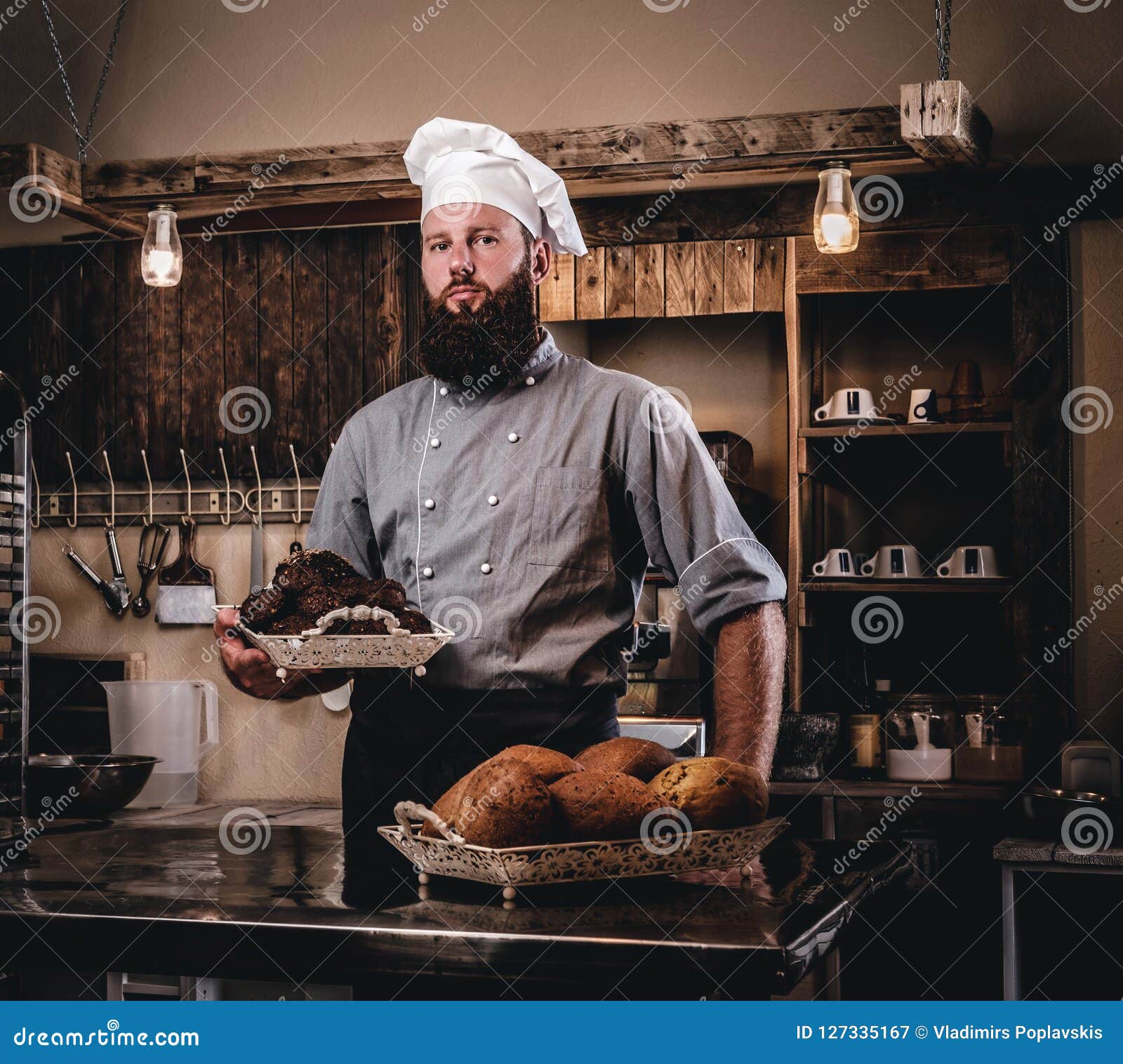 Handsome Bearded Chef in Uniform Showing Tray of Fresh Bread in the ...