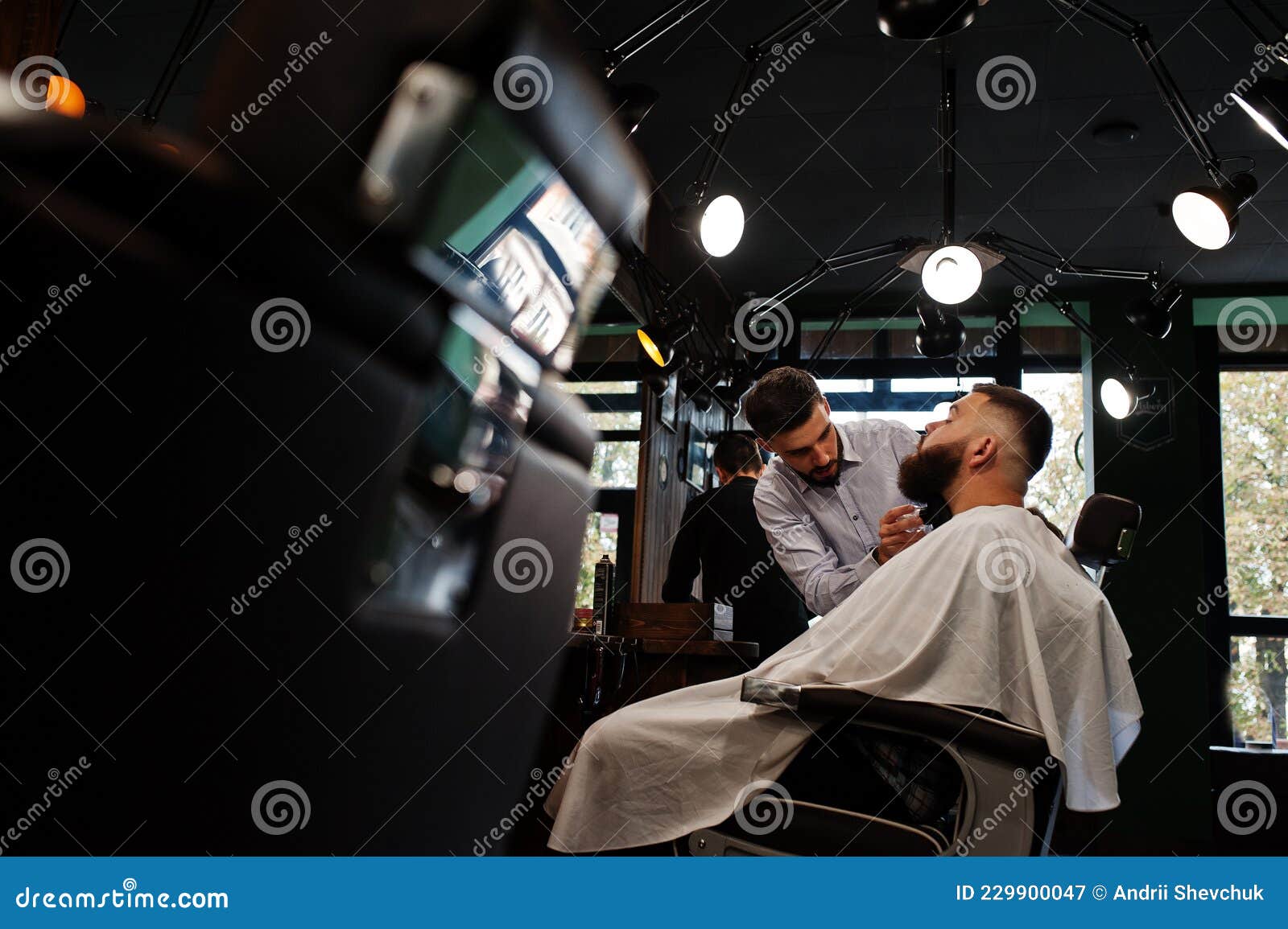 Barbershop, barber at work stock image. Image of customer - 229900047