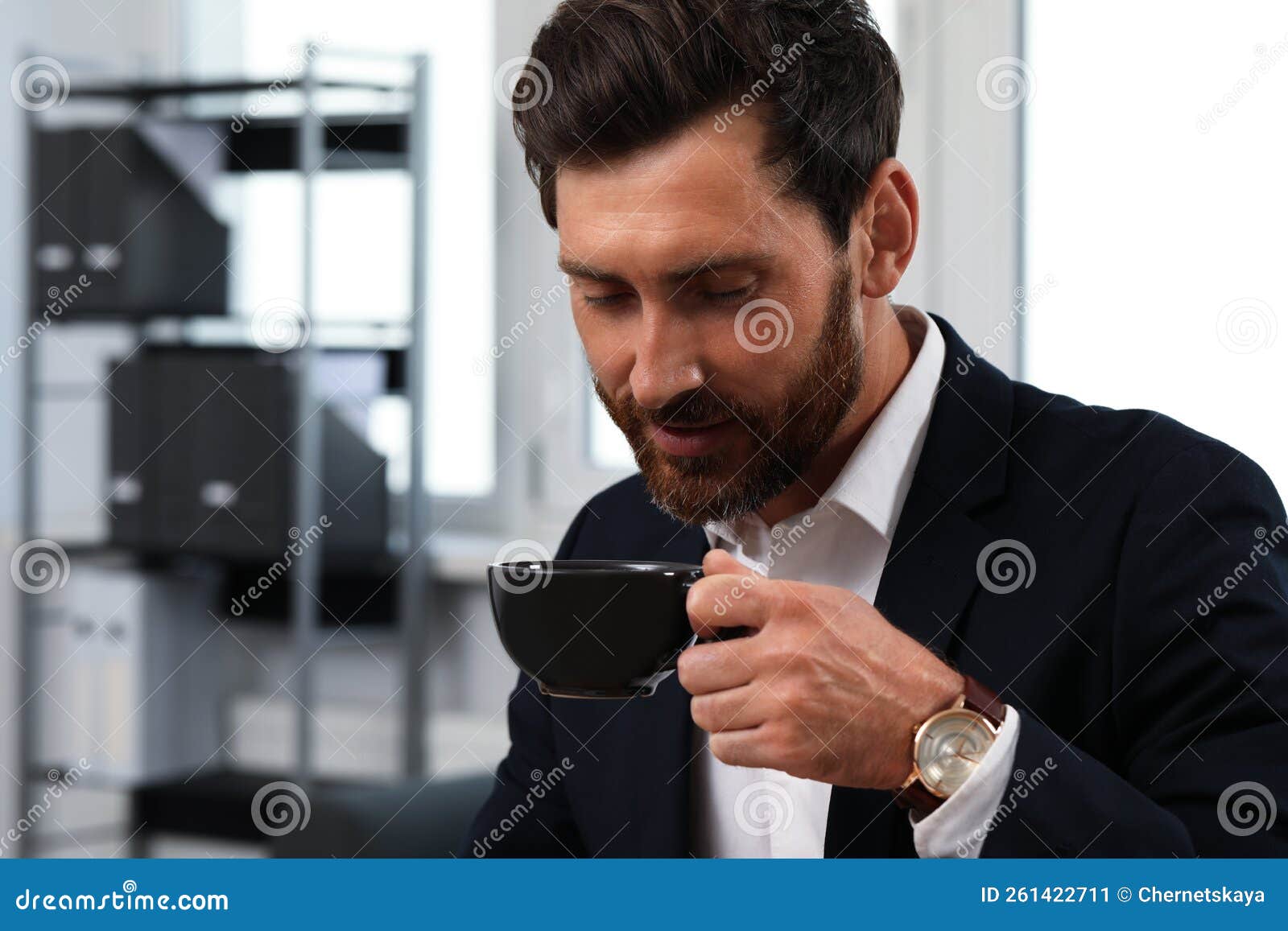 Handsome Bearded Man Drinking Cup of Coffee Indoors Stock Image - Image ...