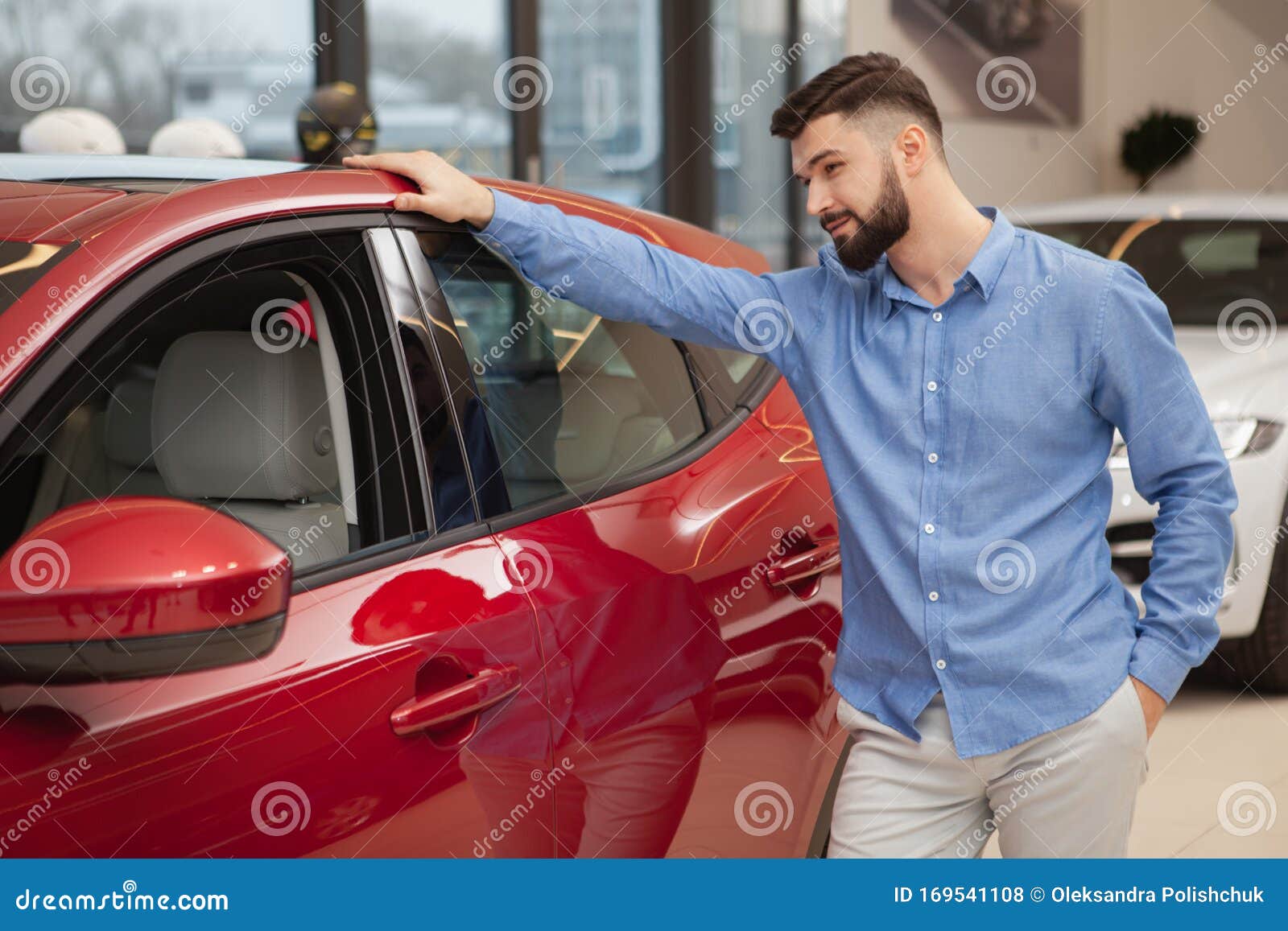 Handsome Young Man Buying New Car at the Dealership Stock Photo - Image ... Handsome Young Man Buying New Car at the Dealership Stock Photo - Image ...