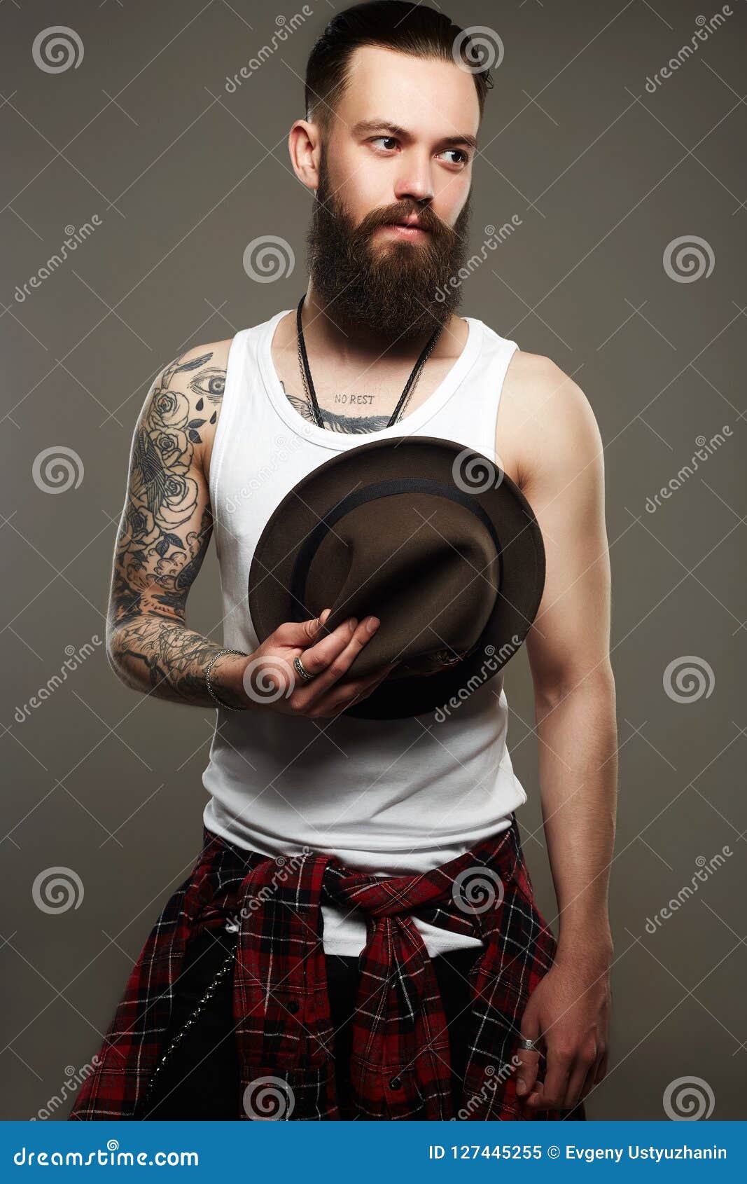 Handsome Bearded Man with Hat. Tattoo Stock Image - Image of casual ... Handsome Bearded Man with Hat. Tattoo Stock Image - Image of casual ...