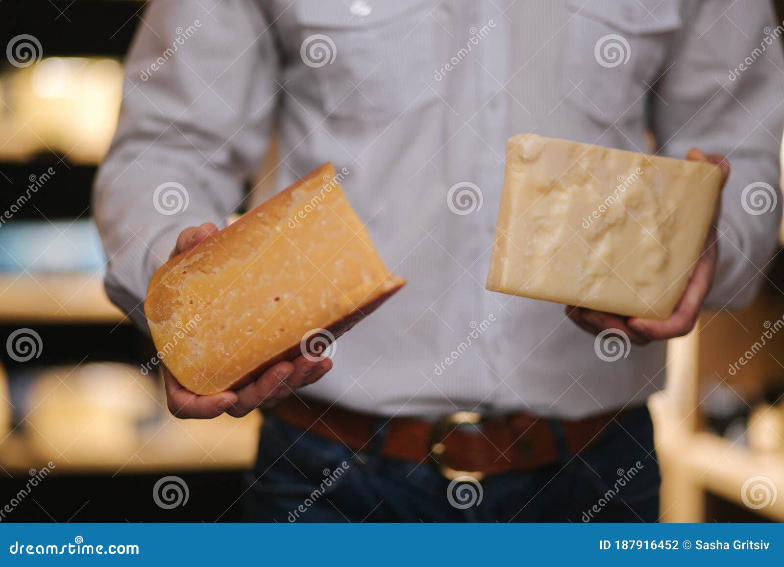 Handsome Bearded Man Hold Different Types of Aged Cheese in Hands at ...