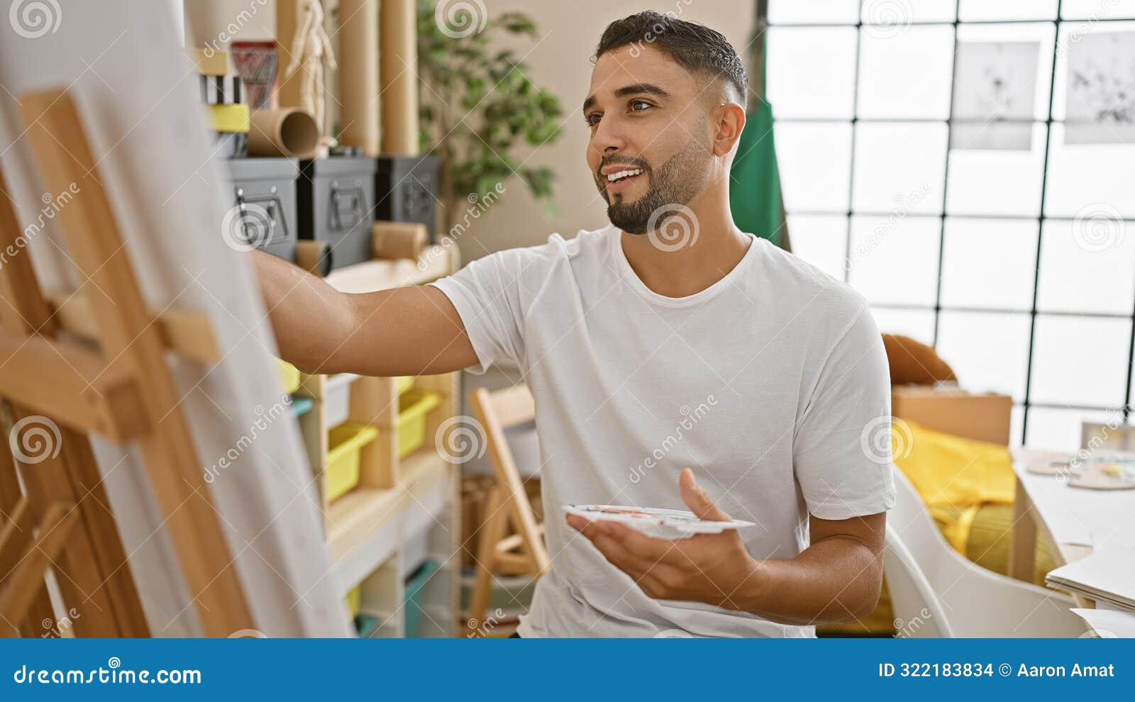 Handsome Man Is Painting His Face In White Color By Greasepaint, Using ...