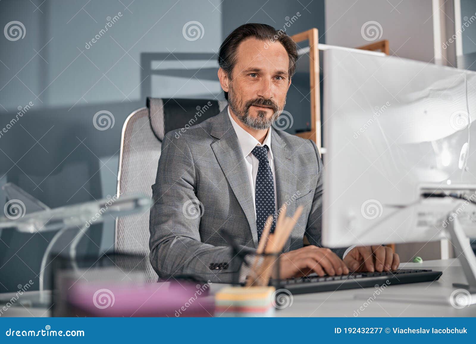 Handsome Bearded Man Using Computer at Work Stock Image - Image of ...
