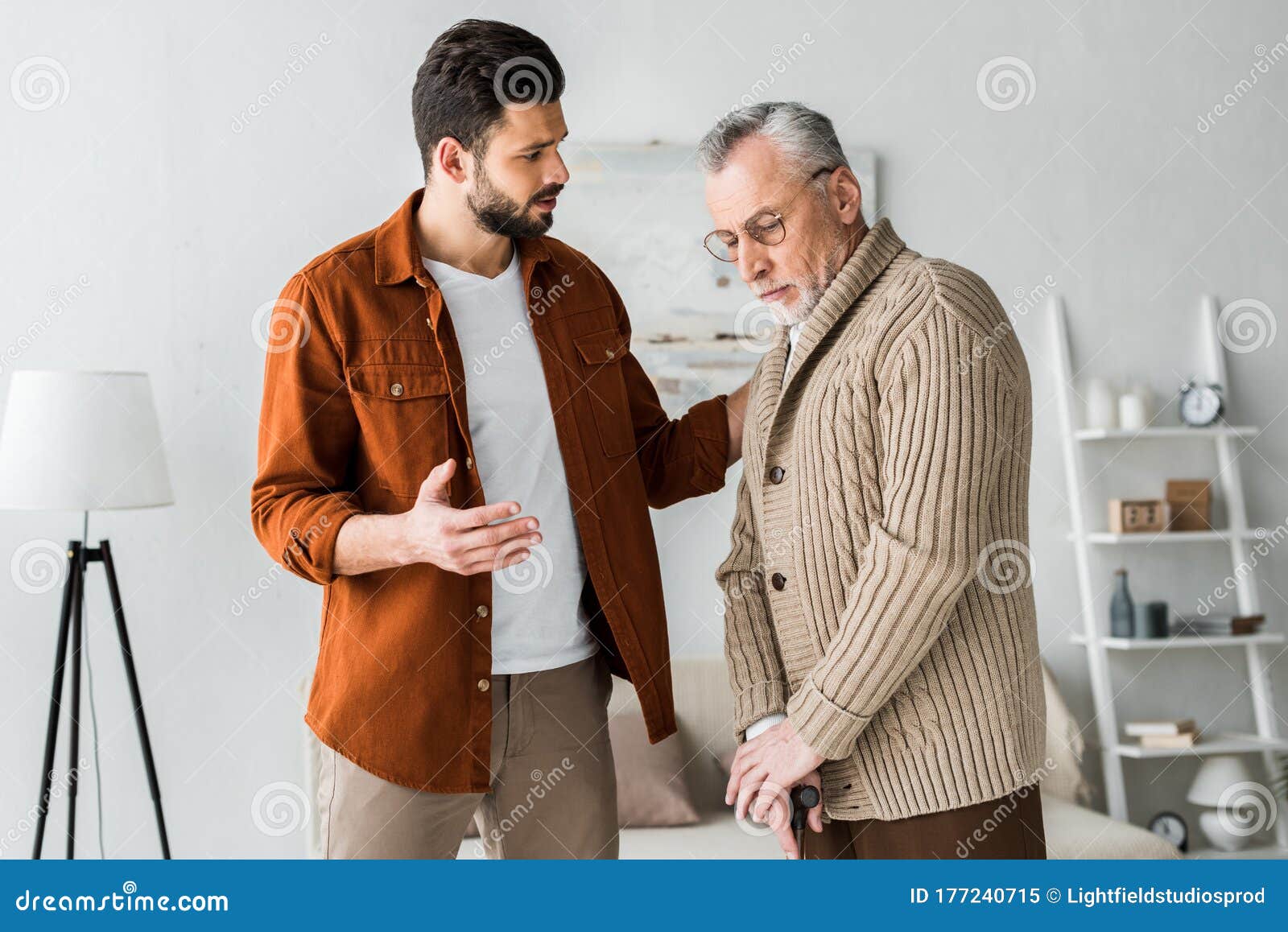 Man Gesturing while Looking at Sad Senior Father Stock Image - Image of ...