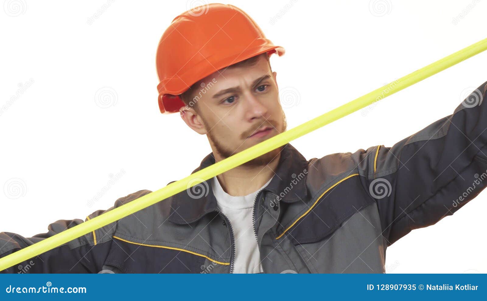 Young Male Engineer Making Measurements Isolated Stock Image - Image of ...