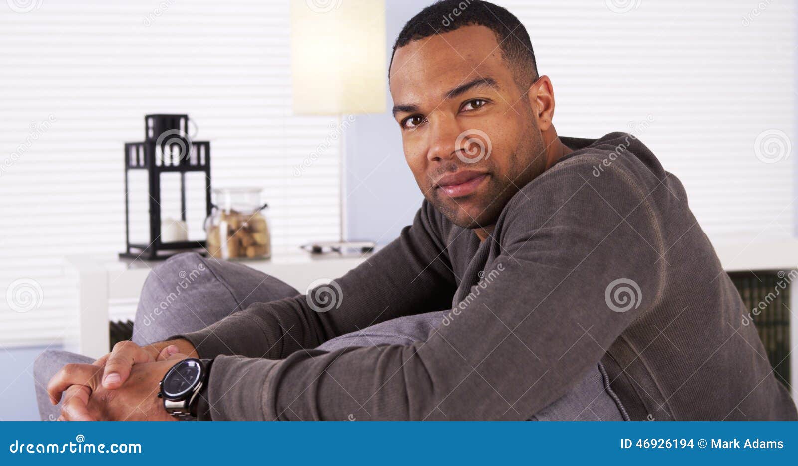 Handsome Black Man Resting on Couch Stock Photo - Image of young ...