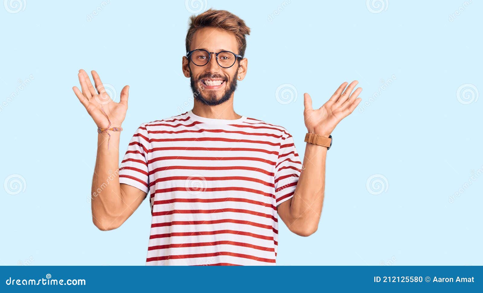 Handsome Blond Man With Beard Wearing Casual Clothes And Glasses