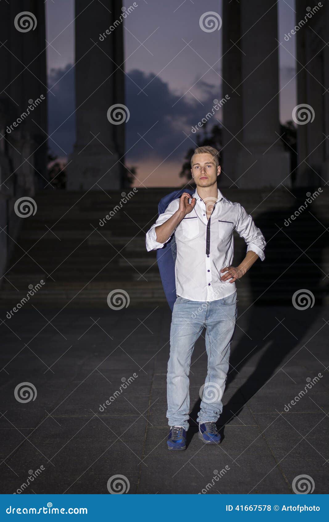 Handsome Blond Young Man with Marble Columns Behind Him Stock Photo ...