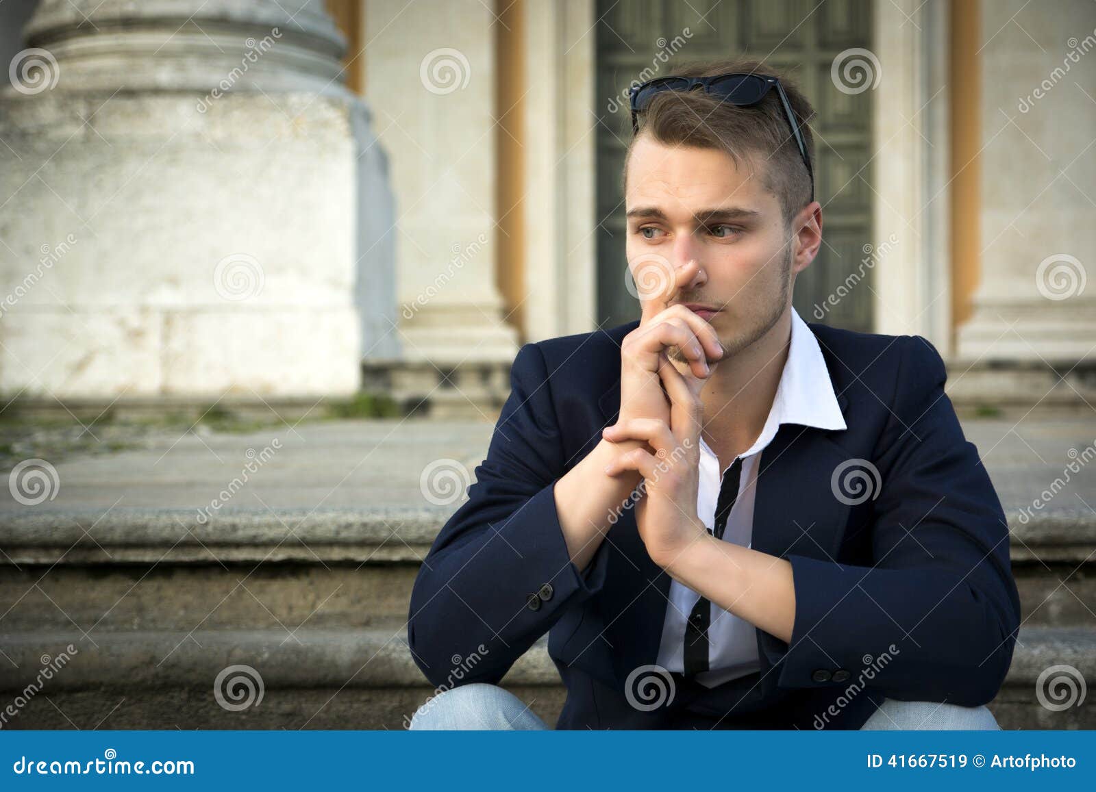 Handsome Blond Young Man with Marble Columns Behind Him Stock Image ...