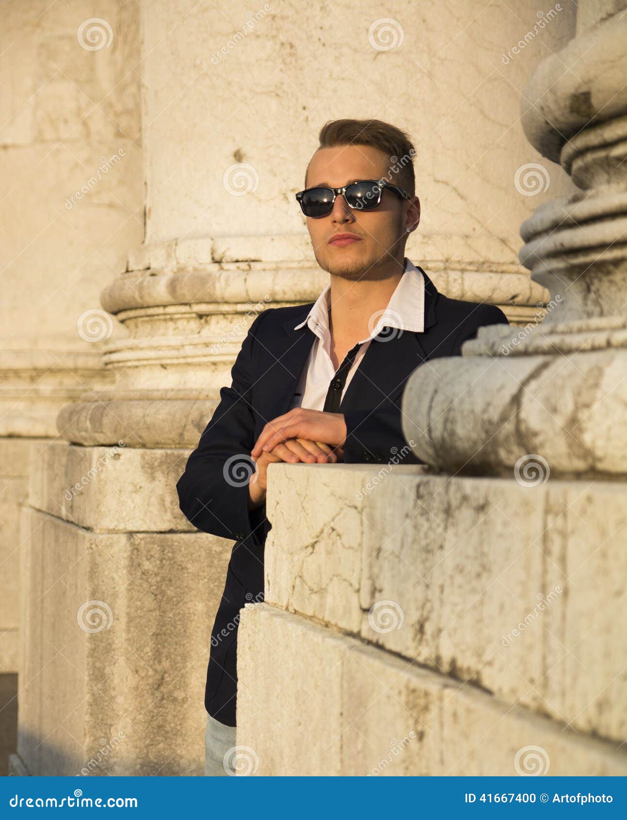 Handsome Blond Young Man among Marble Columns Stock Photo - Image of ...